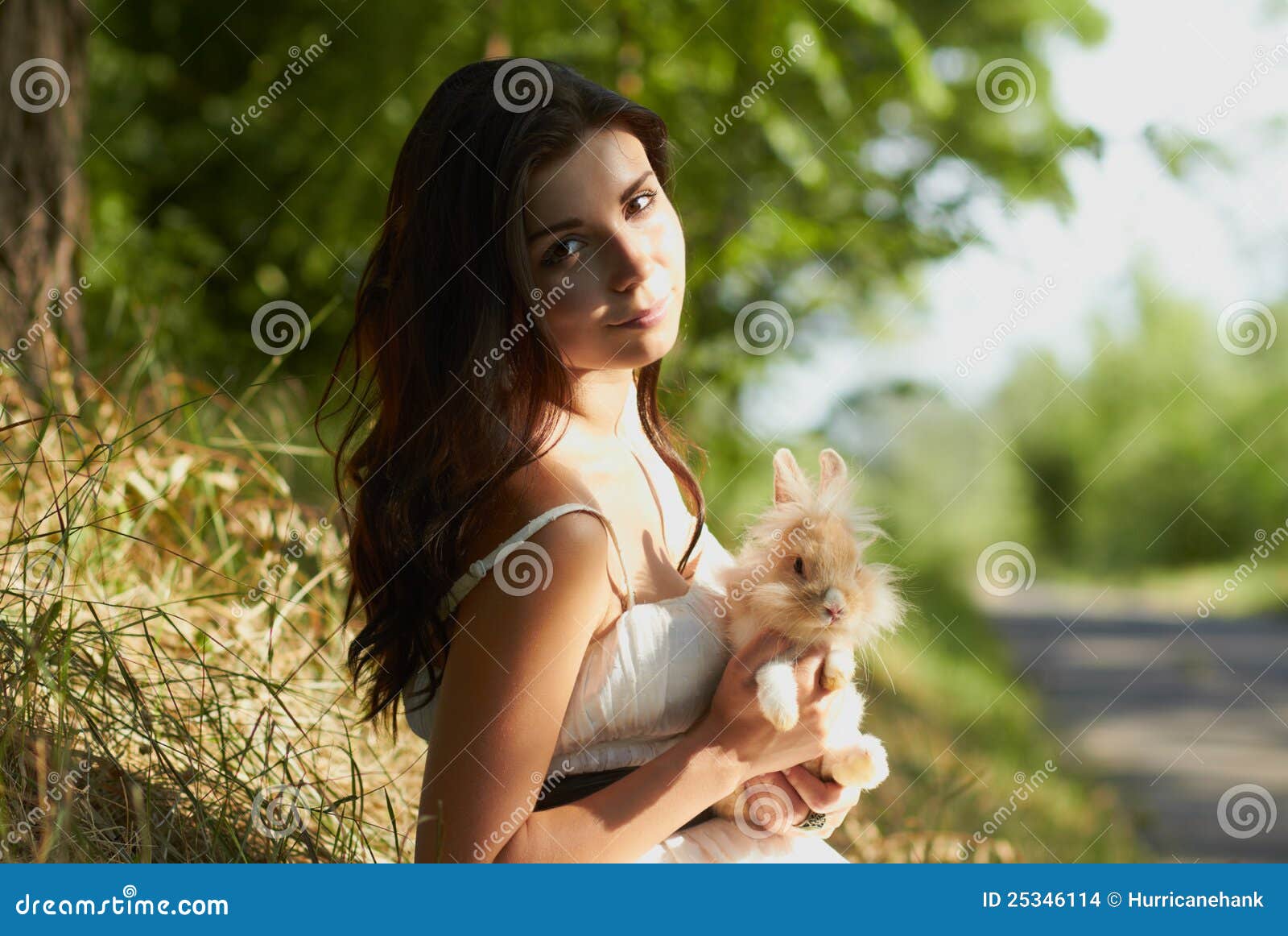 Beautiful Young Girl Holding a Bunny Stock Photo - Image of attractive ...