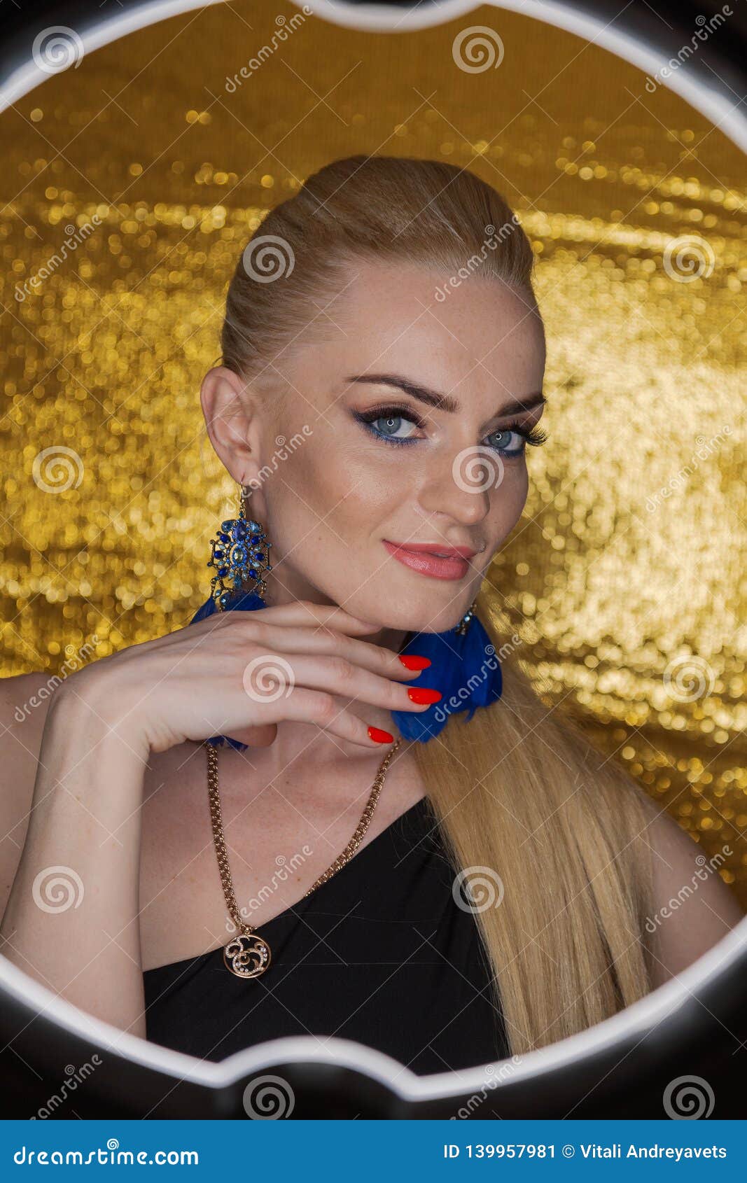 Beautiful Young Girl Looking at the Camera through a Ring Lamp. Stock ...