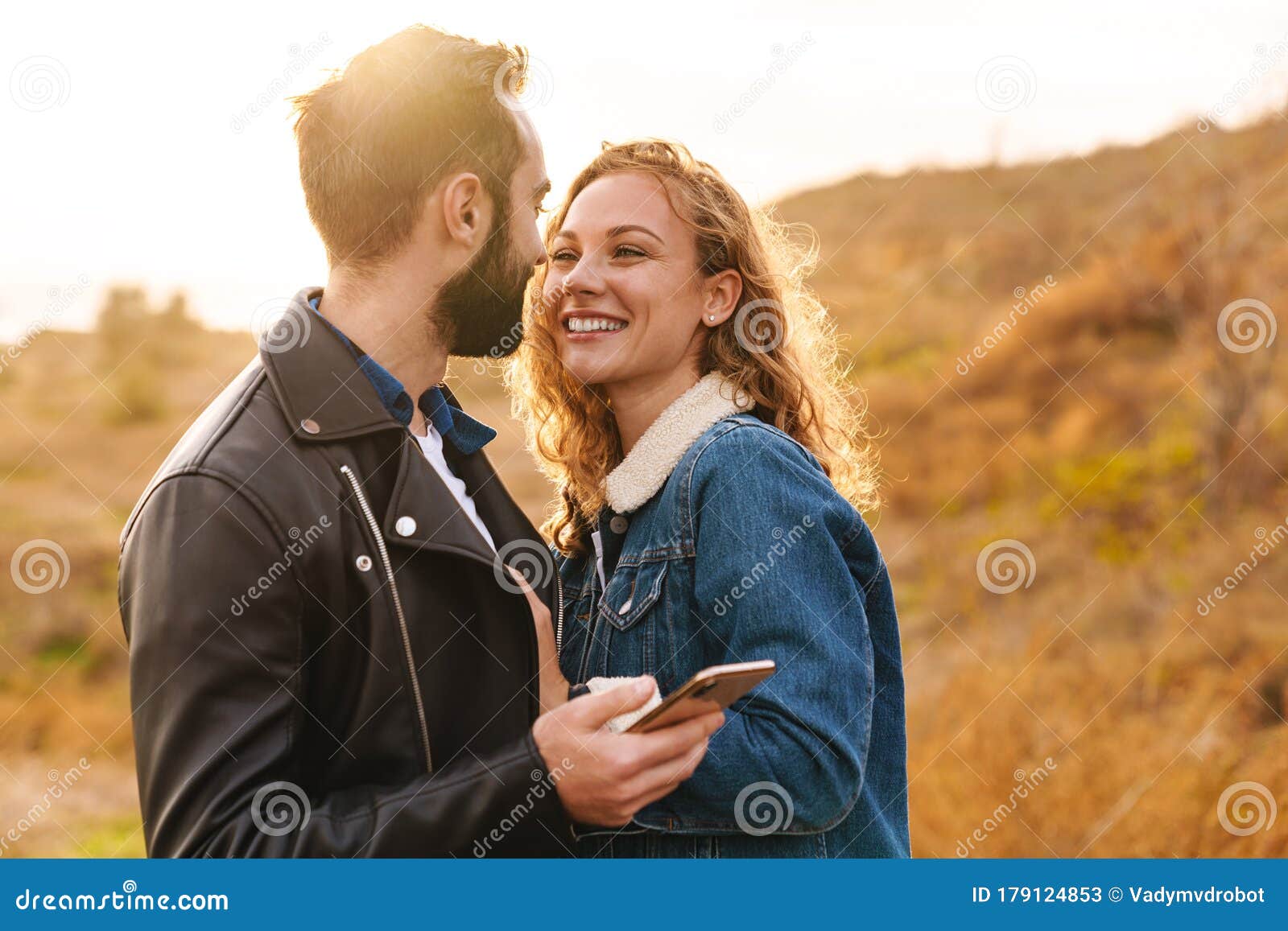 Beautiful Young Happy Stylish Couple Wearing Jackets Stock Image