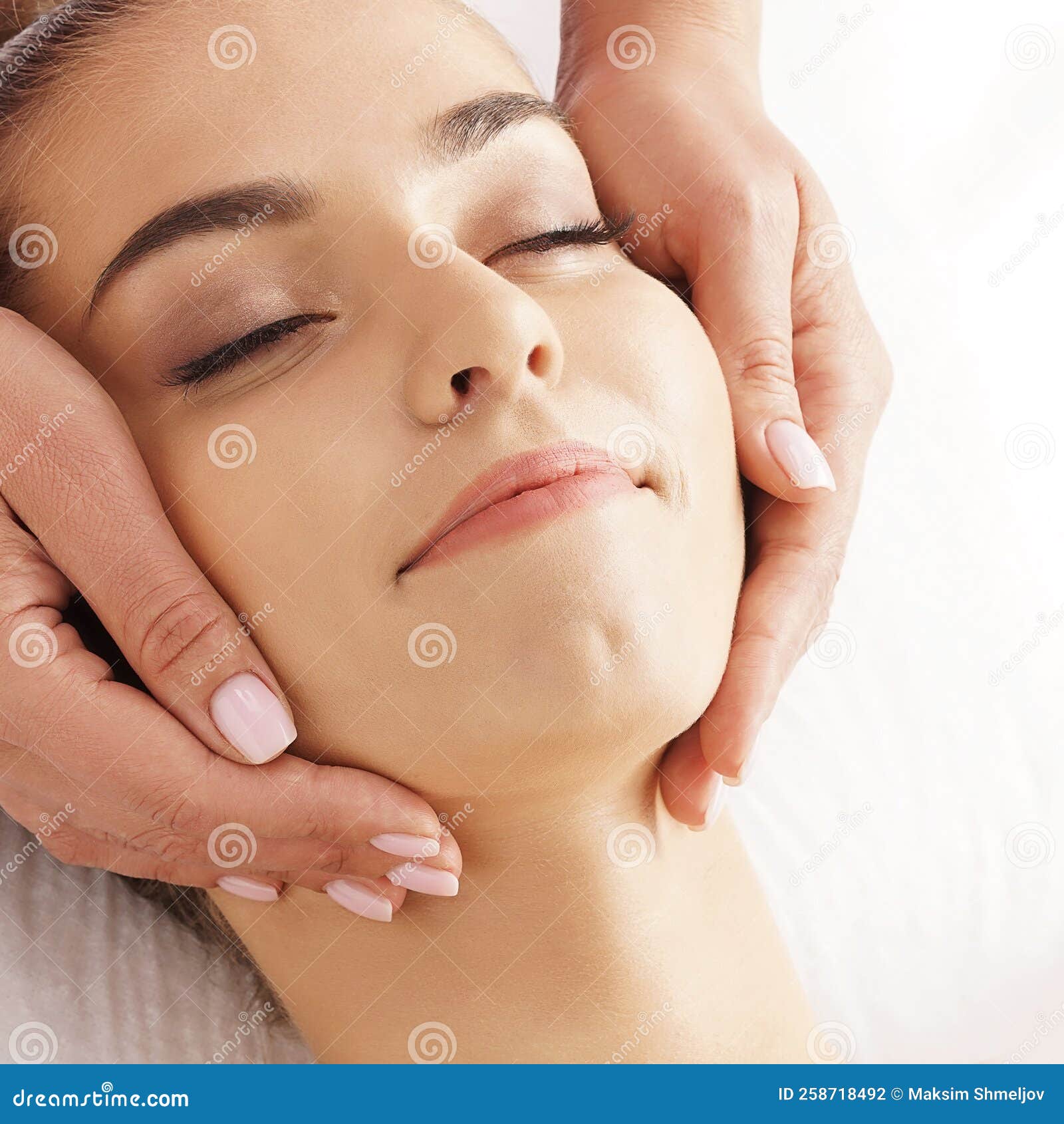 Beautiful Young And Healthy Woman Having Face Massage In Spa Salon