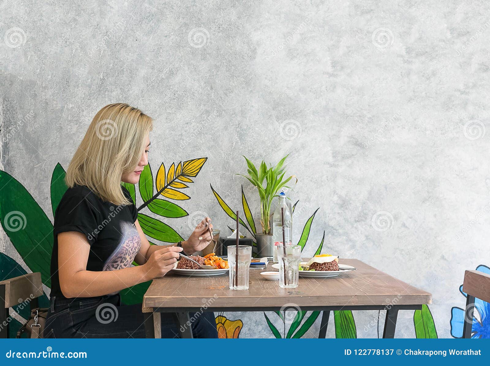 Beautiful Young Lady Alone in Restaurant. Stock Image - Image of dress ...