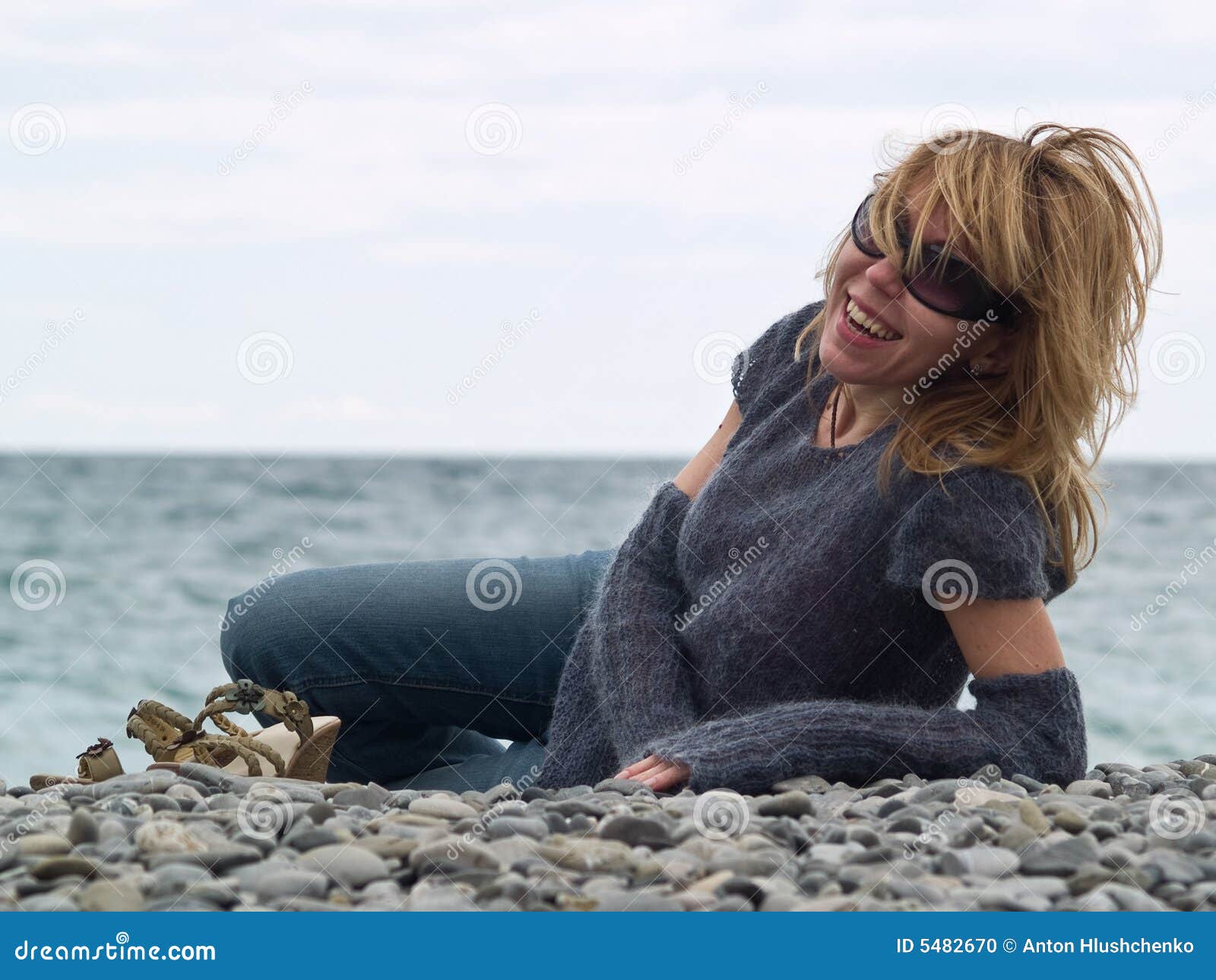 Beautiful Young Lady Smiling on Beach Stock Photo - Image of lying ...