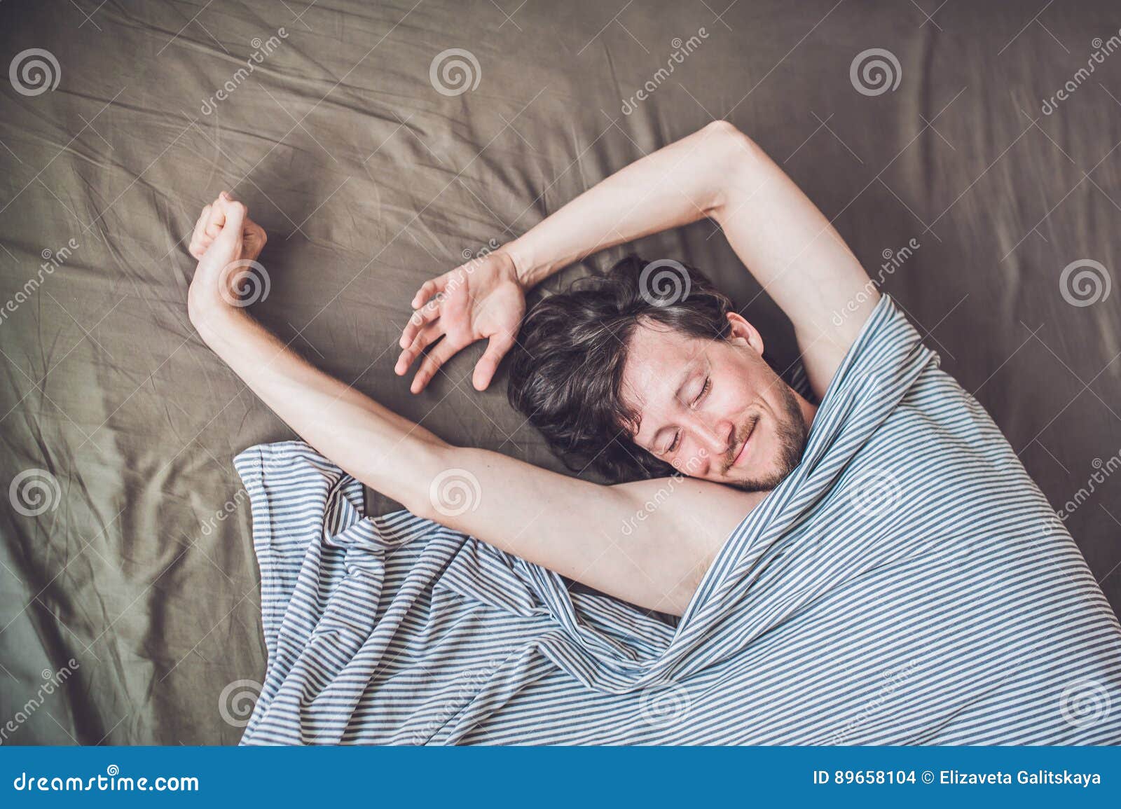 Beautiful Young Man Lying Down in Bed and Sleeping, Top View. Do Not ...