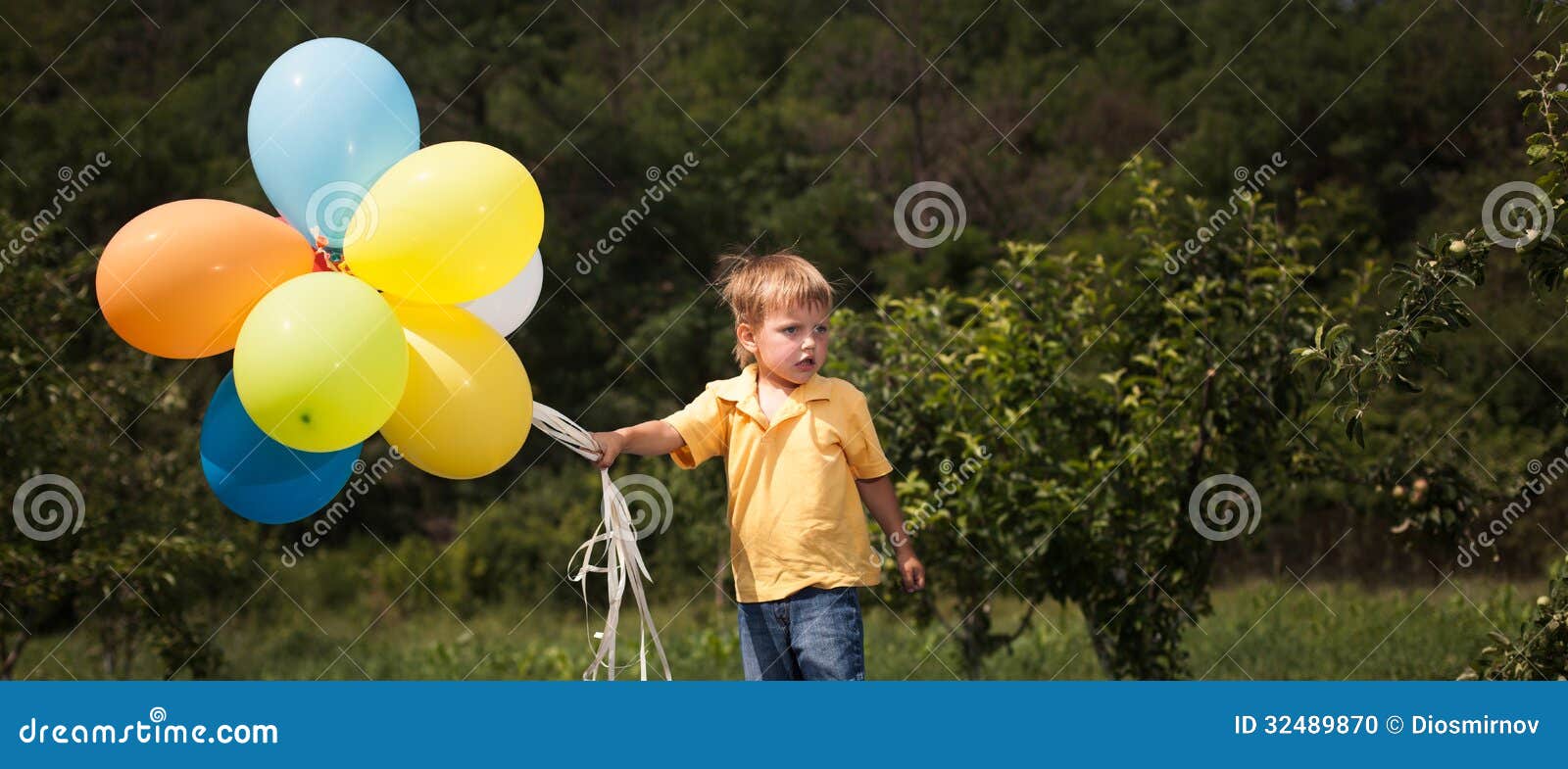 Beautiful Young Man in a Spring Field with Lots of Stock Photo - Image ...