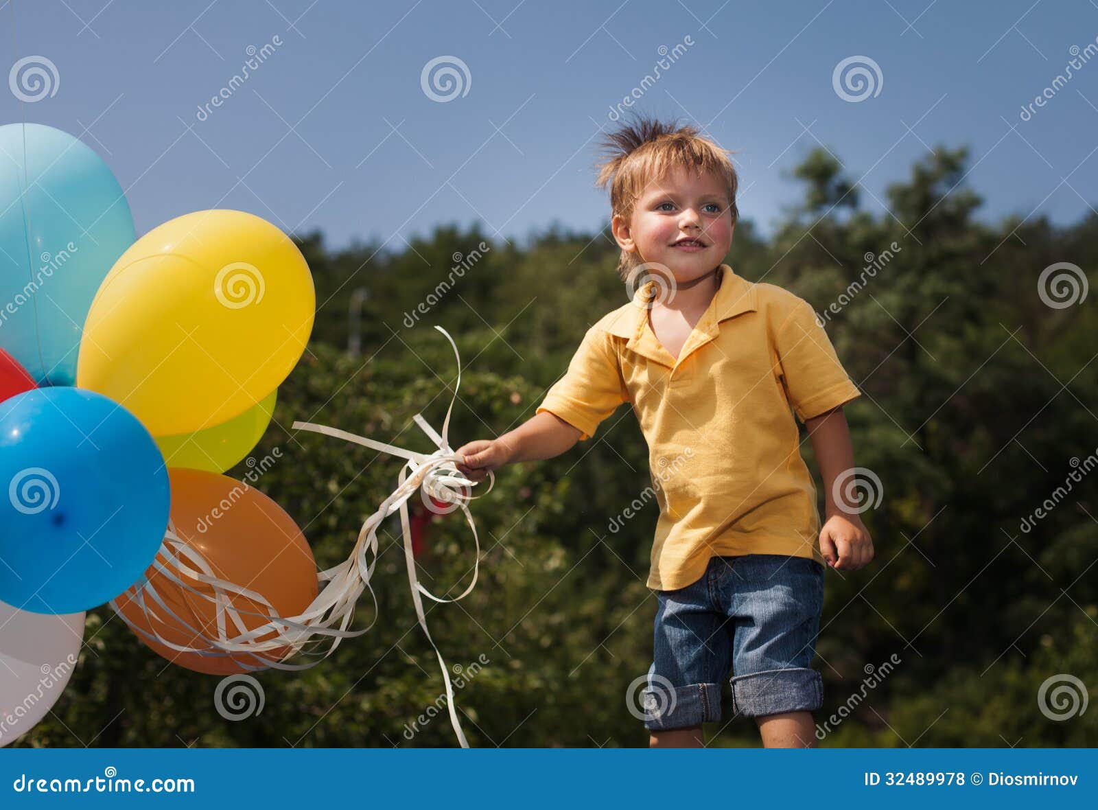 Beautiful Young Man in a Spring Field with Lots of Stock Photo - Image ...