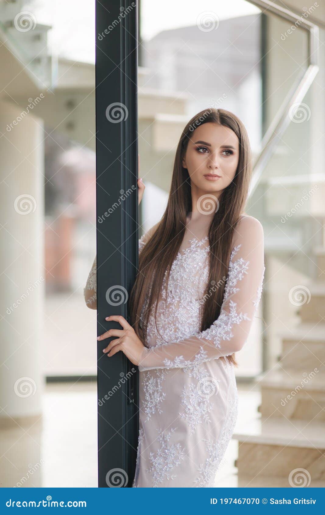 Beautiful Young Model in Evening Drees Posing To Photographer Stock ...