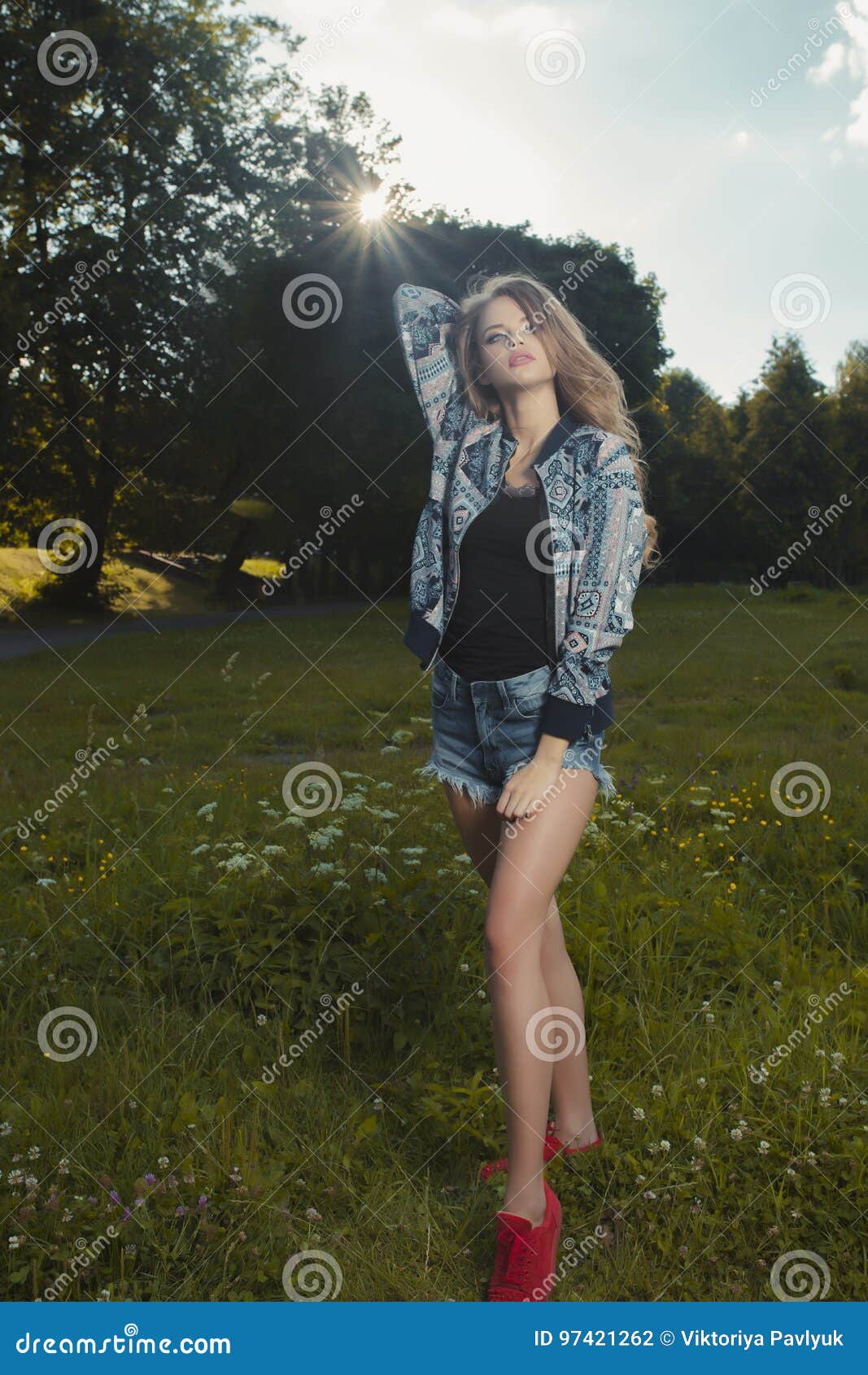 Beautiful Young Model with Long Legs Posing at the Park Stock Photo ...