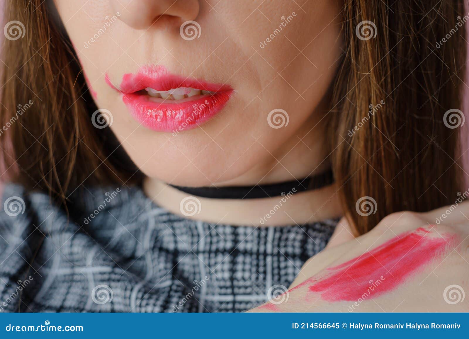 Beautiful Young Model With Pink Lipstick Smeared On Her Hand Stock