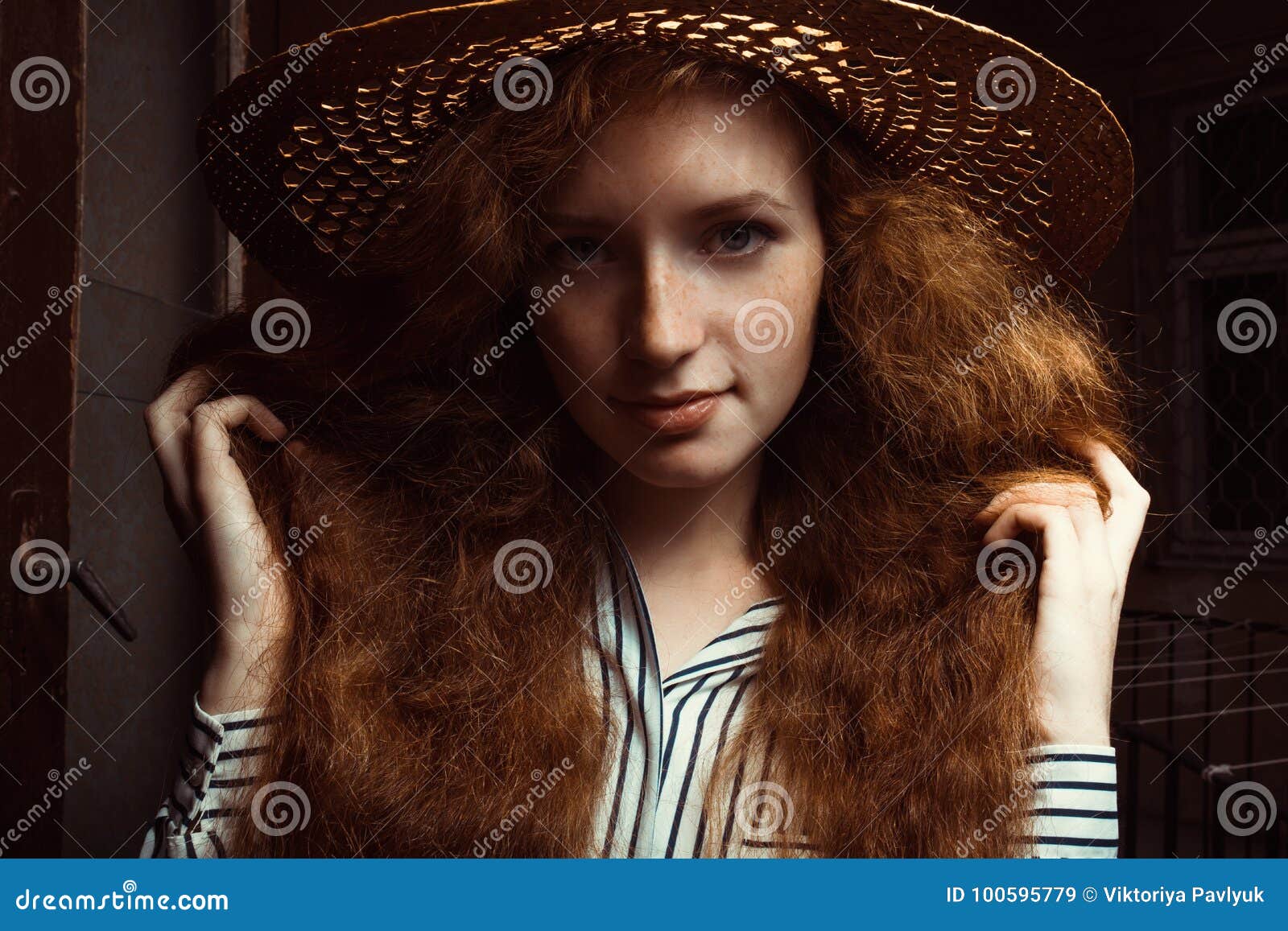 Beautiful Young Red Haired Model With Curly Hair In Straw Hat Po Stock