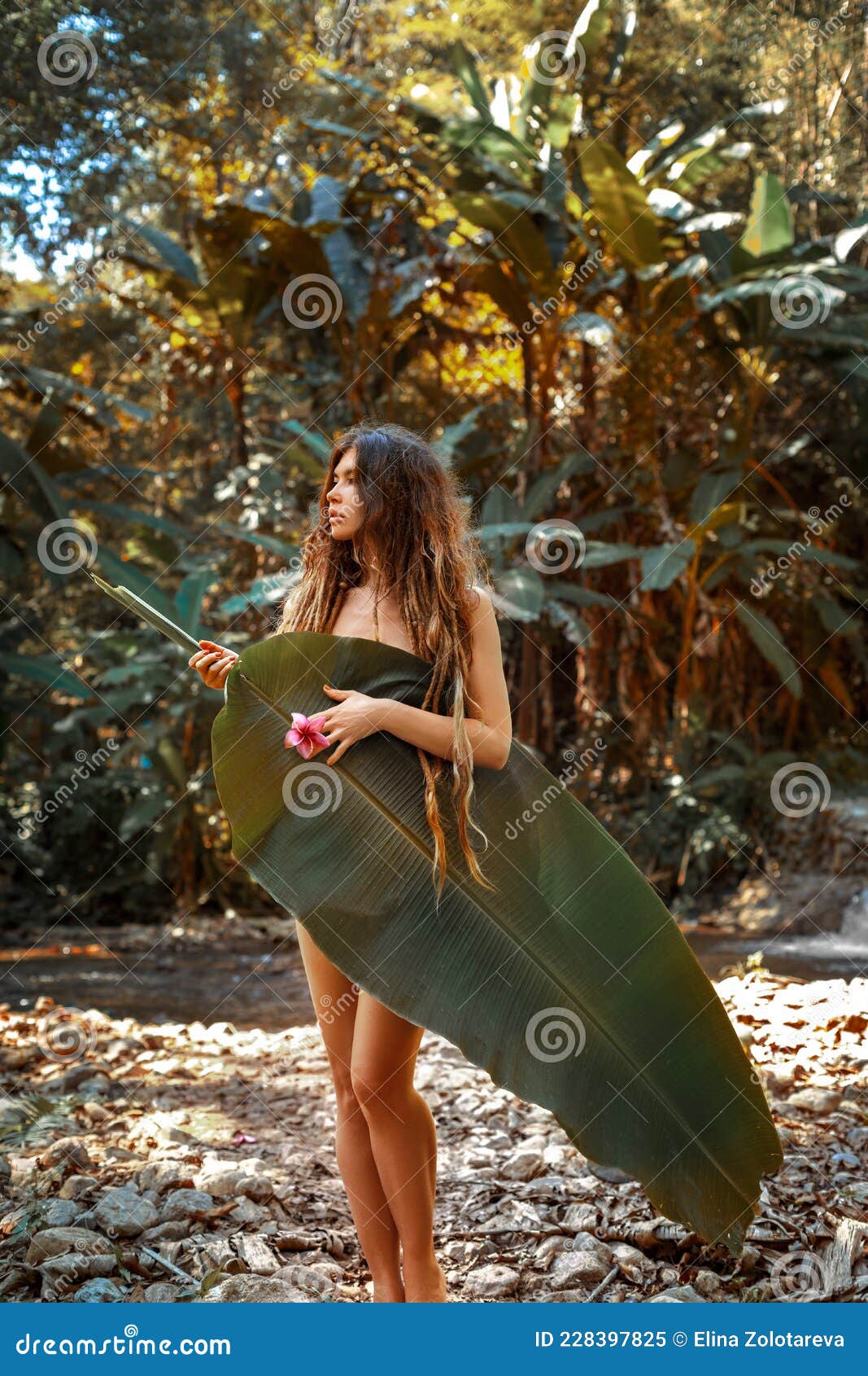 Beautiful Young Nude Woman Cover Her Body With Palm Leaf Posing