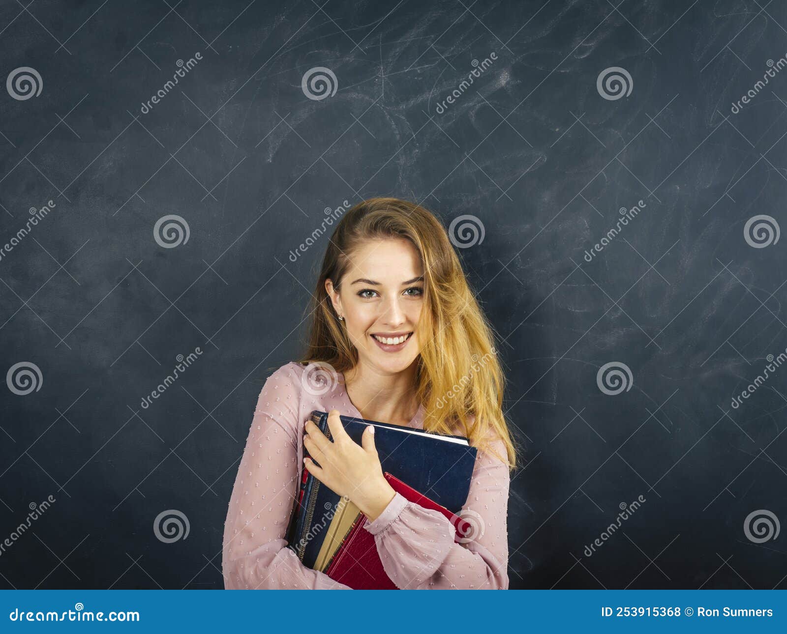 Beautiful Young Student in Front of Blackboard Stock Photo - Image of ...