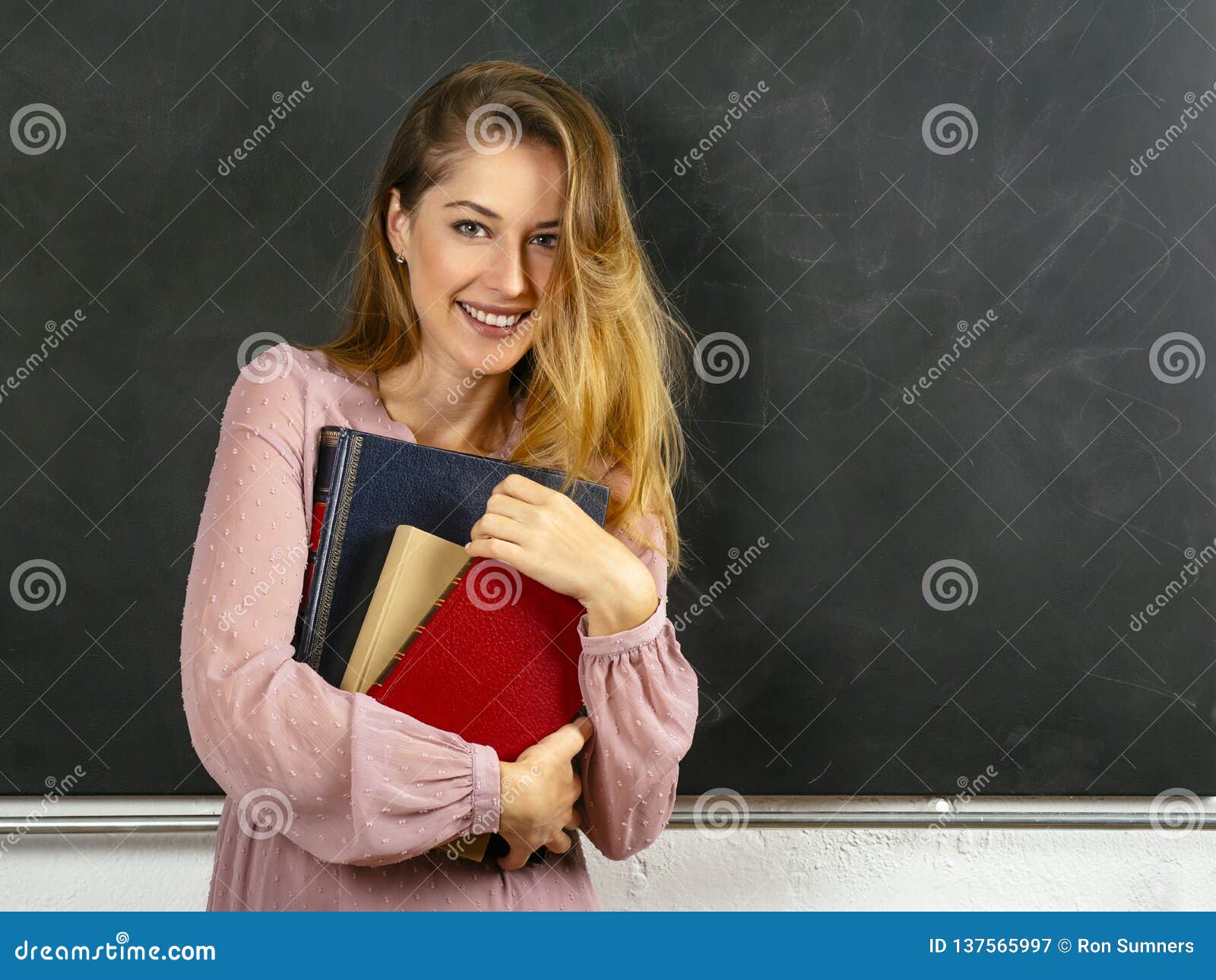 Beautiful Young Student in Front of Blackboard Stock Image - Image of ...