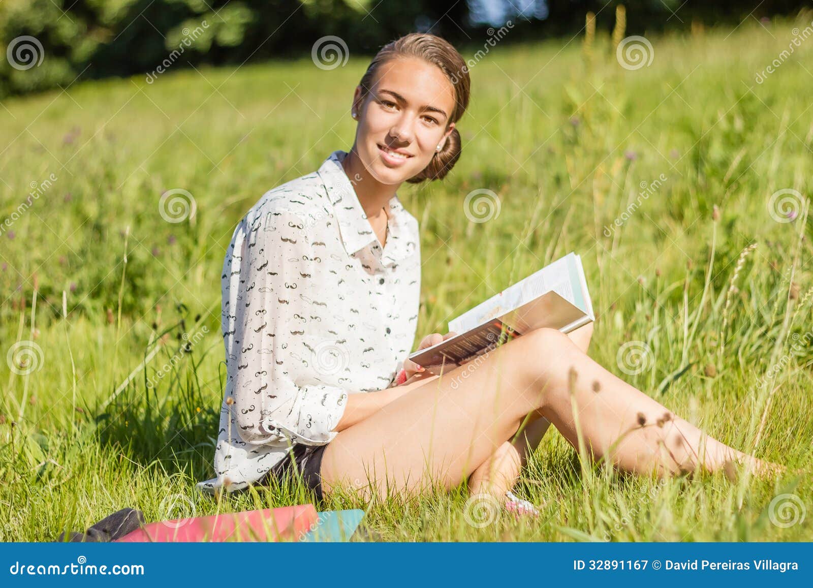 Beautiful Young Student Reading a Book in the Park Stock Image - Image ...