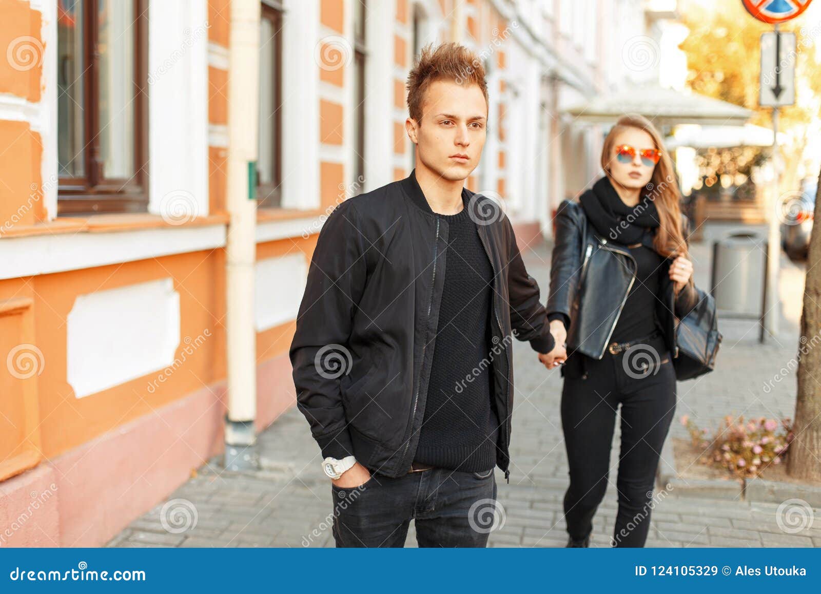 Beautiful Young Stylish Couple With Fancy Clothes Walking Stock Image