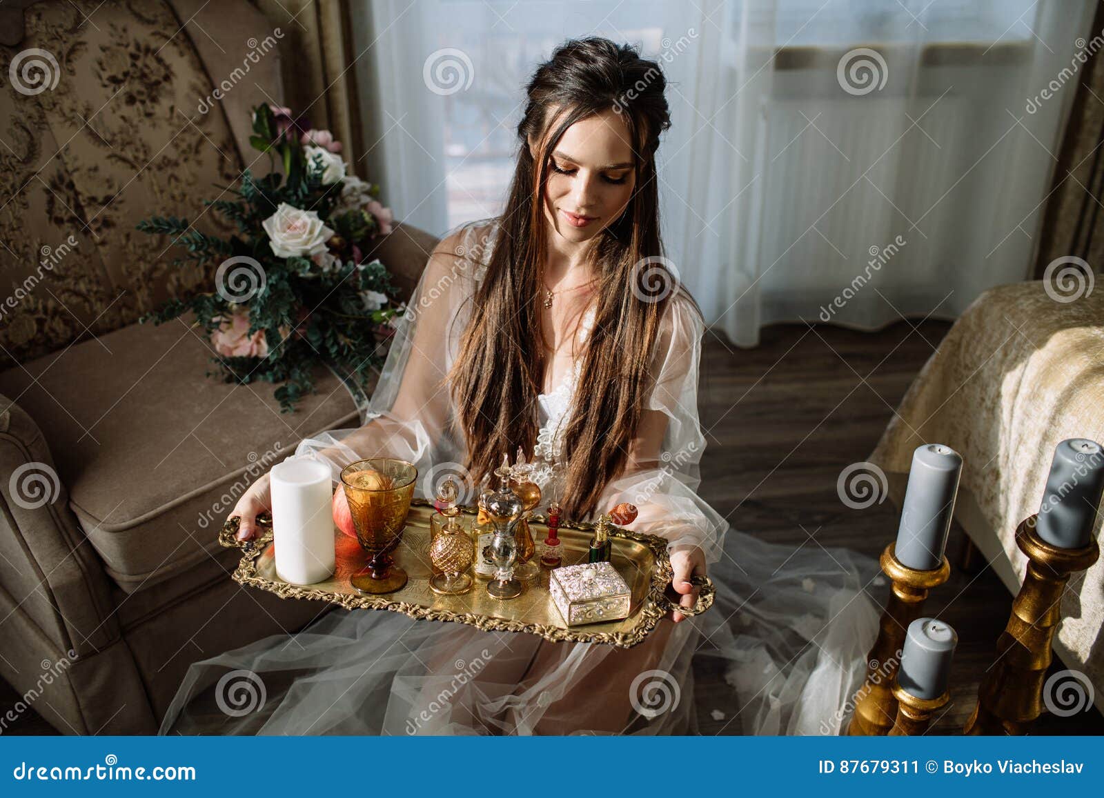 Beautiful Young Sweet Blonde Girl With A Wedding Bouquet In The Hands