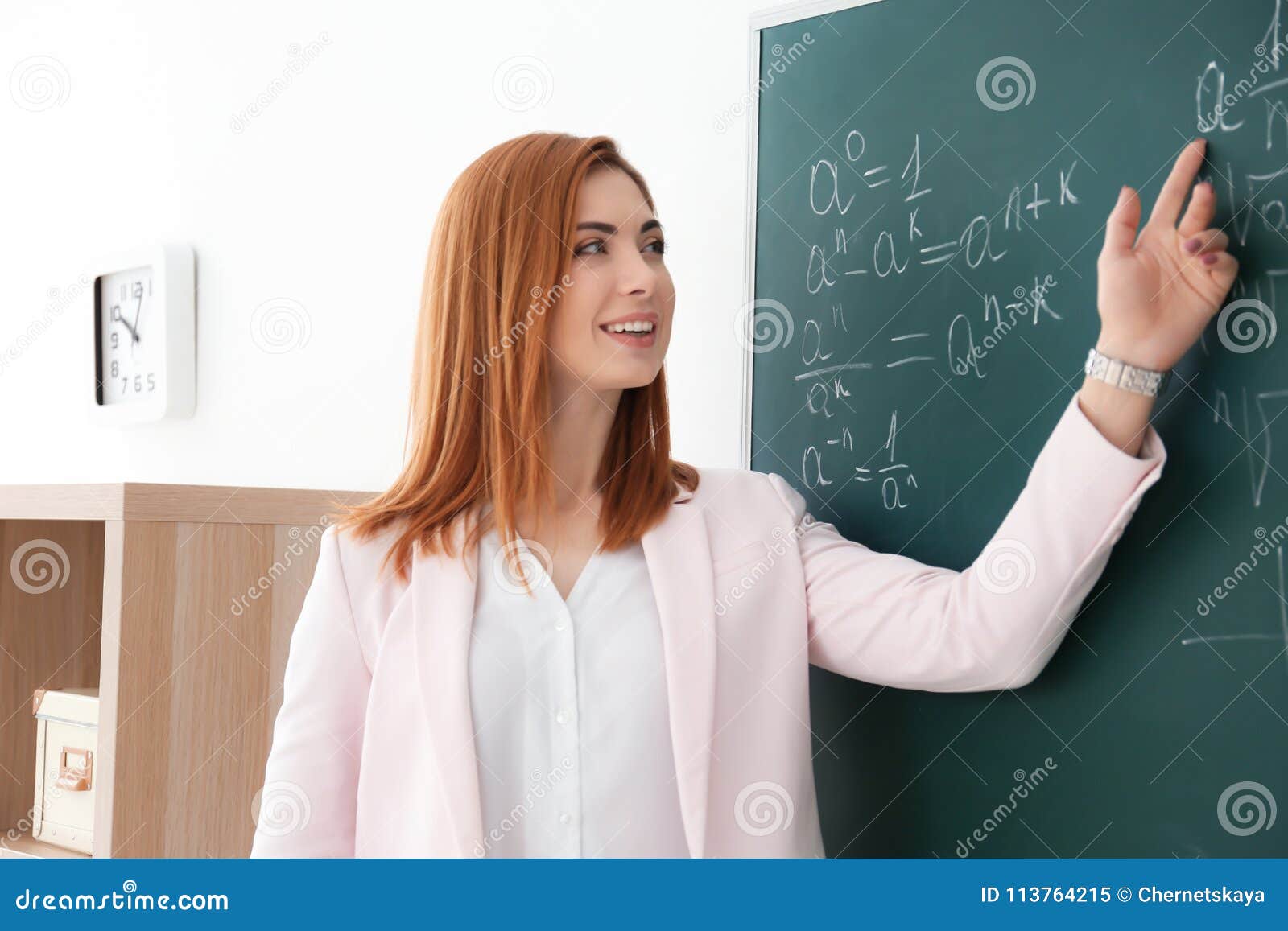 Beautiful Young Teacher Explaining Math Formulas Stock Image - Image of ...