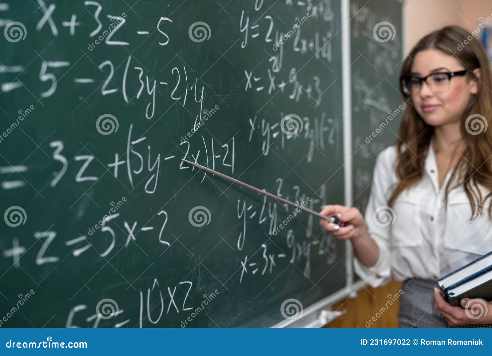 Beautiful Young Teacher Shows a Pointer To the Solution of Math ...
