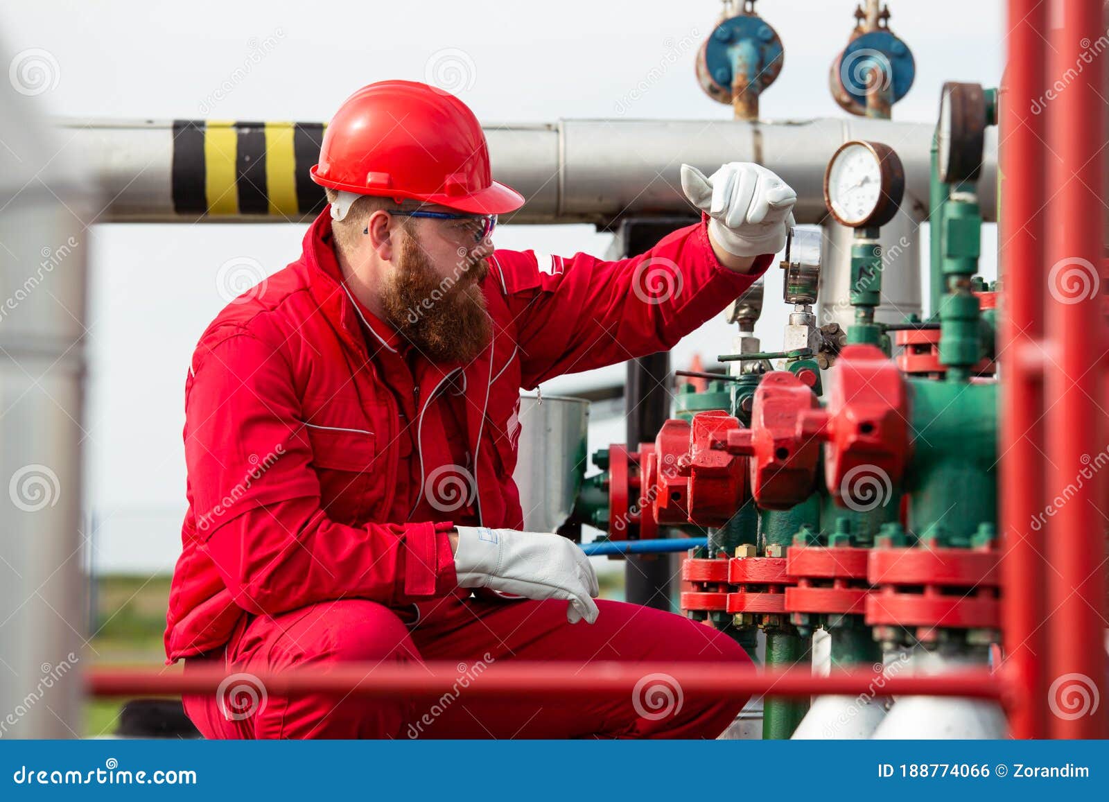 Technician in Oil and Gas Refinery. Worker in Oil Refinery Stock Photo ... Technician in Oil and Gas Refinery. Worker in Oil Refinery Stock Photo ...