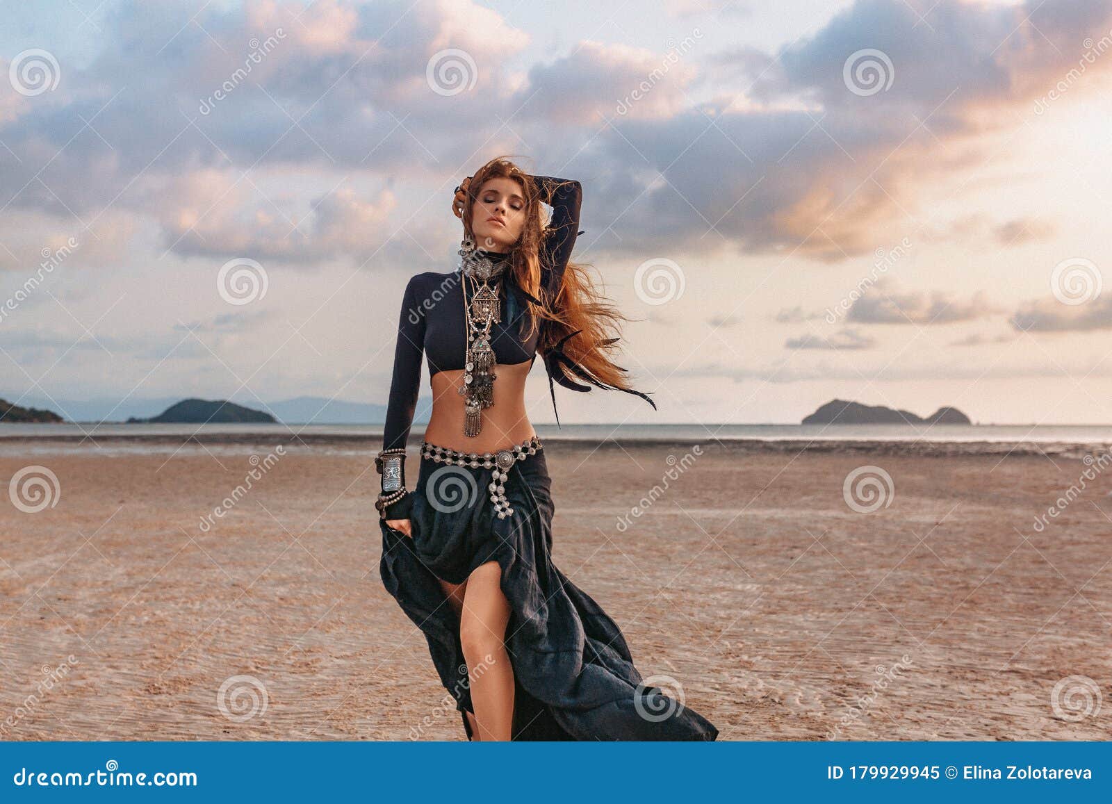 Beautiful Young Tribal Style Woman On The Beach At Sunset Stock Image