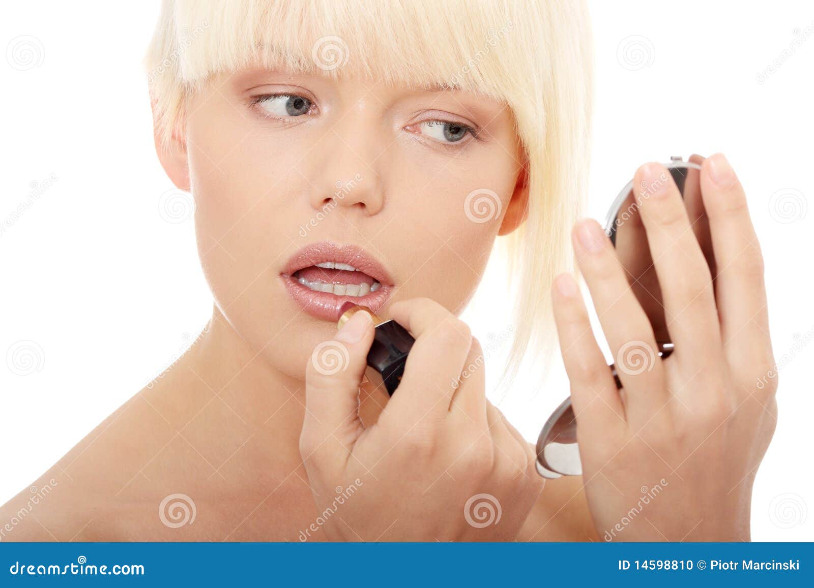 A Beautiful Young Woman Applying Her Make-up Stock Photo - Image of ...