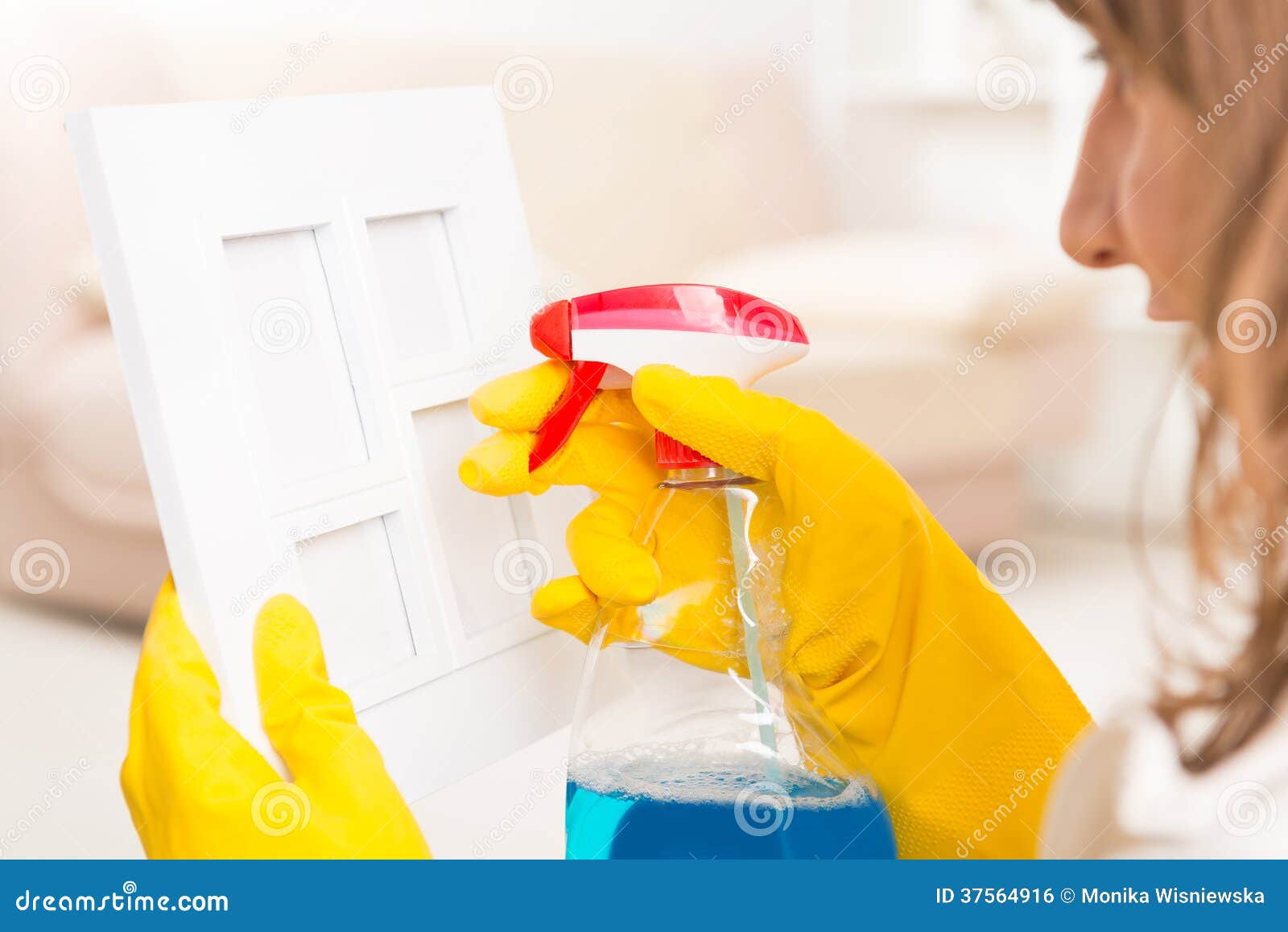 Beautiful Young Woman Cleaning Frame Stock Photo - Image of indoors ...