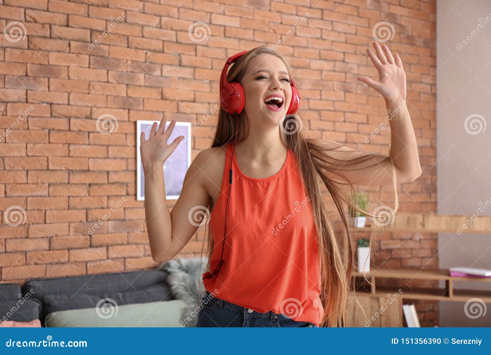 Beautiful Young Woman Dancing at Home Stock Photo - Image of headphones ...