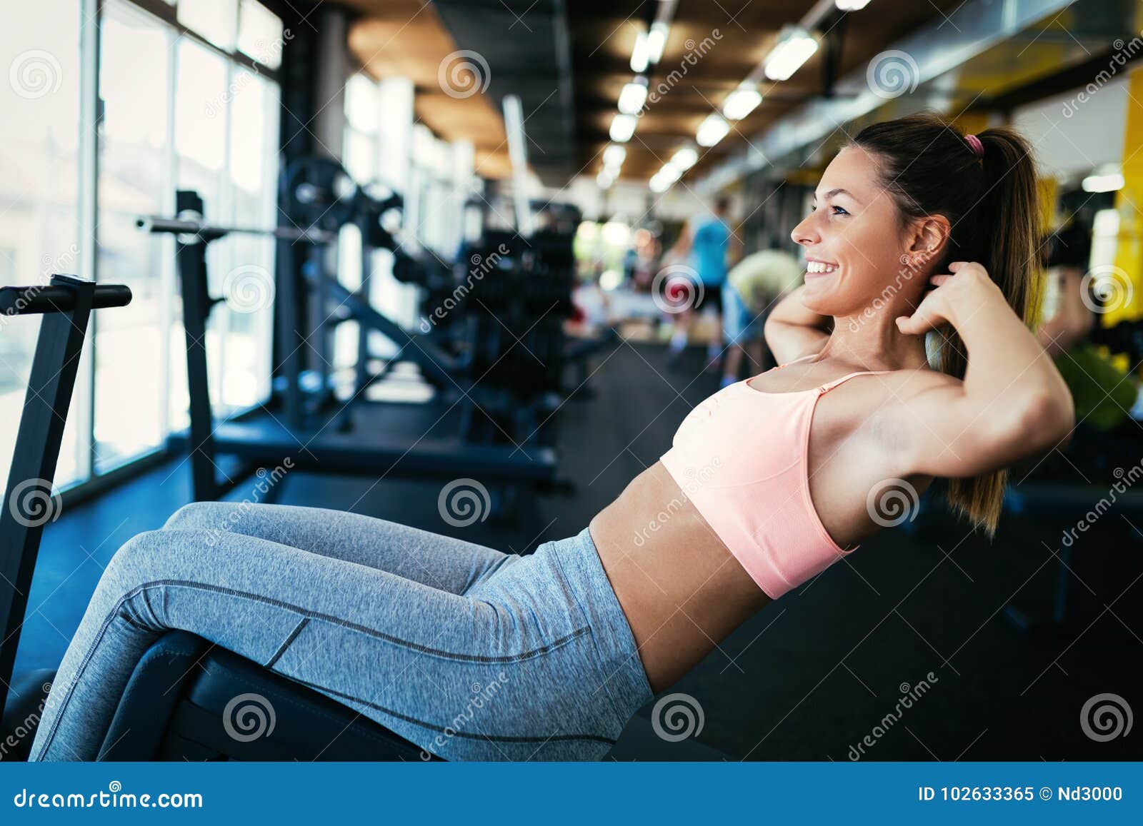 Beautiful Woman Doing Exercises for Abs in Gym Stock Image - Image of ...