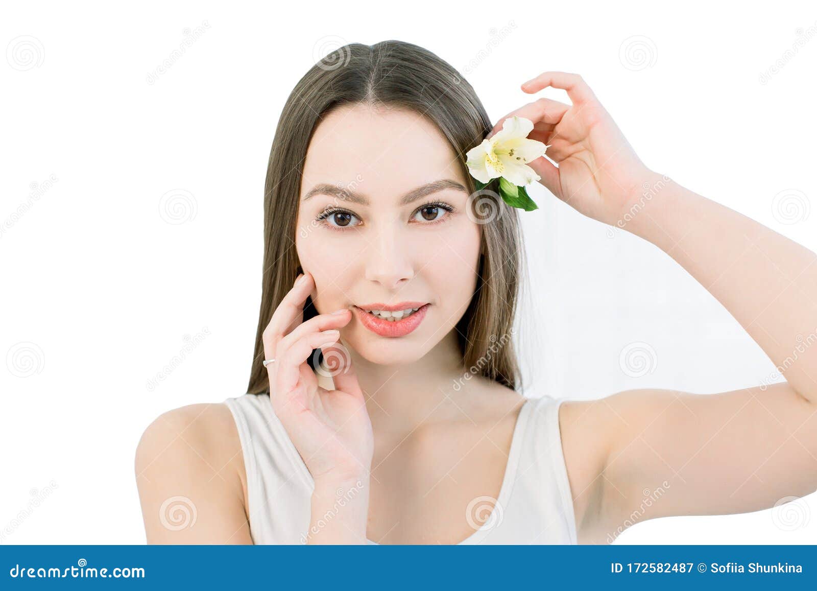 Beautiful Young Woman With Flower In Hand Near Face Closeup Portrait
