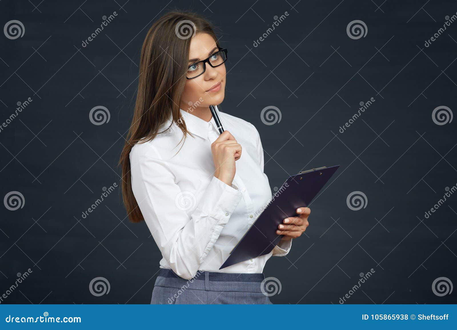 Beautiful Young Woman Holding Clipboard with Pen Thinking. Stock Photo ... Beautiful Young Woman Holding Clipboard with Pen Thinking. Stock Photo ...