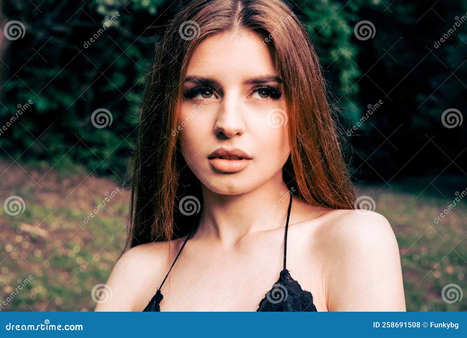 Beautiful Young Woman with Long Hair in a Green Park Stock Photo ... Beautiful Young Woman with Long Hair in a Green Park Stock Photo ...