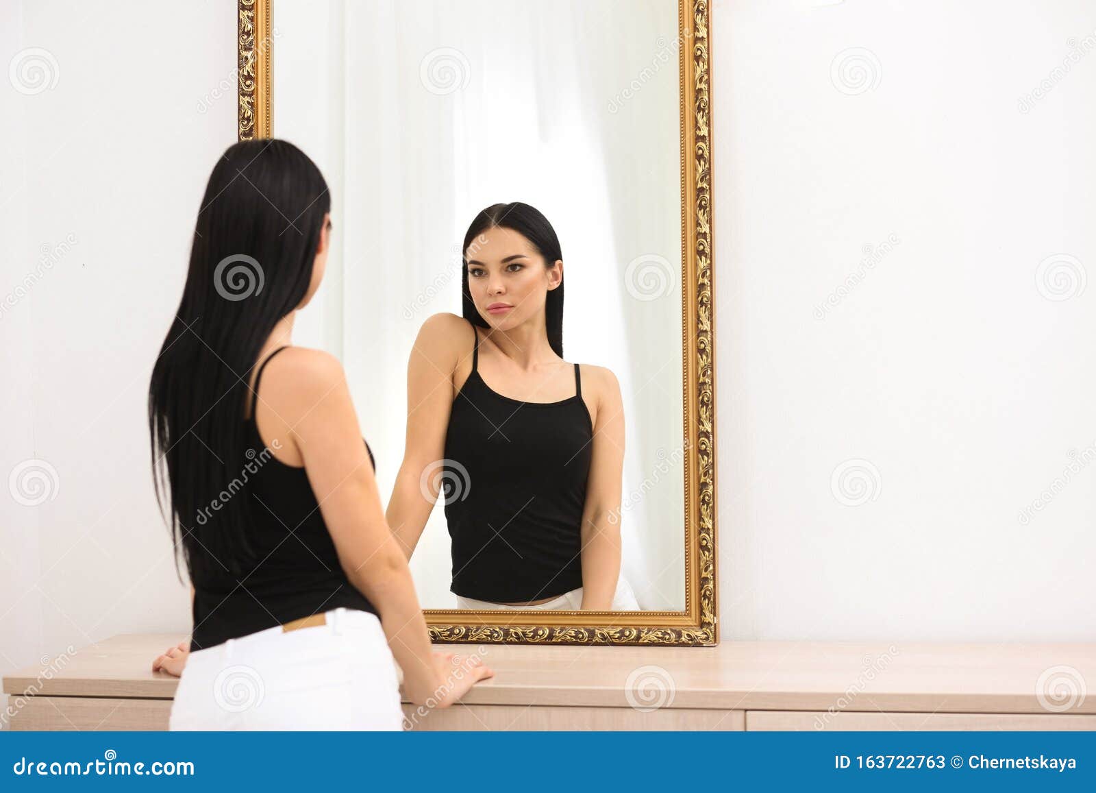 Beautiful Young Woman Looking At Herself In Mirror Stock Image Image