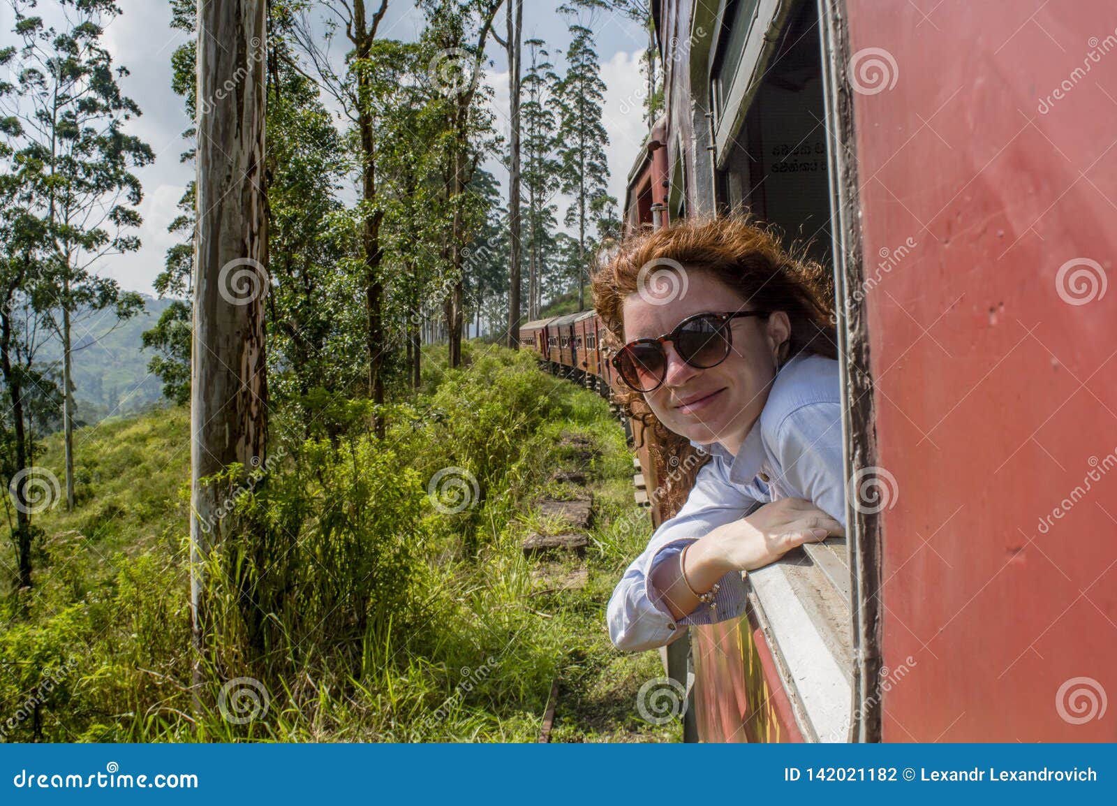 Beautiful Young Woman Looking Out from the Window in the Train Stock ... Beautiful Young Woman Looking Out from the Window in the Train Stock ...