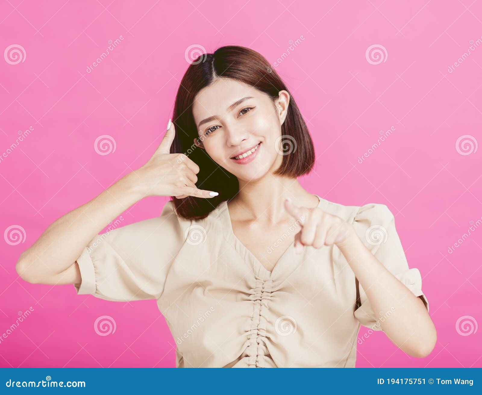 Beautiful Young Woman Making a Call Me Gesture Stock Image - Image of ...