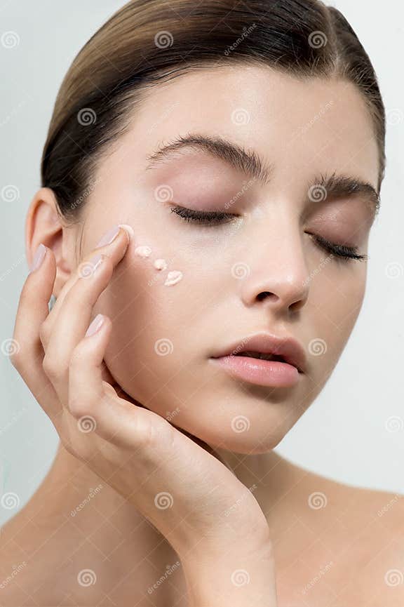 Beautiful Young Woman With Perfect Skin And Natural Make Up Posing