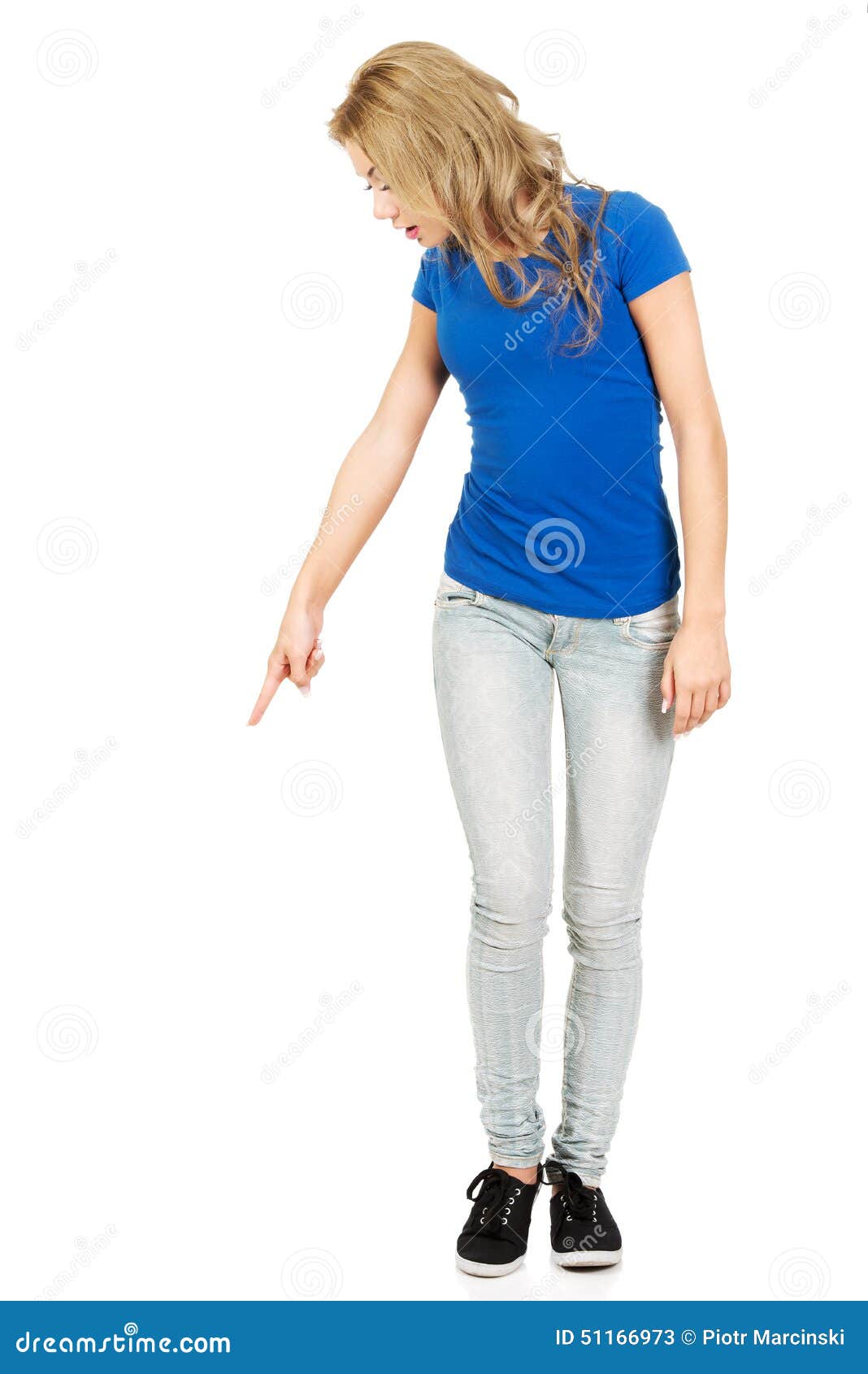 Beautiful Young Woman Pointing Down. Stock Image - Image of copyspace ...