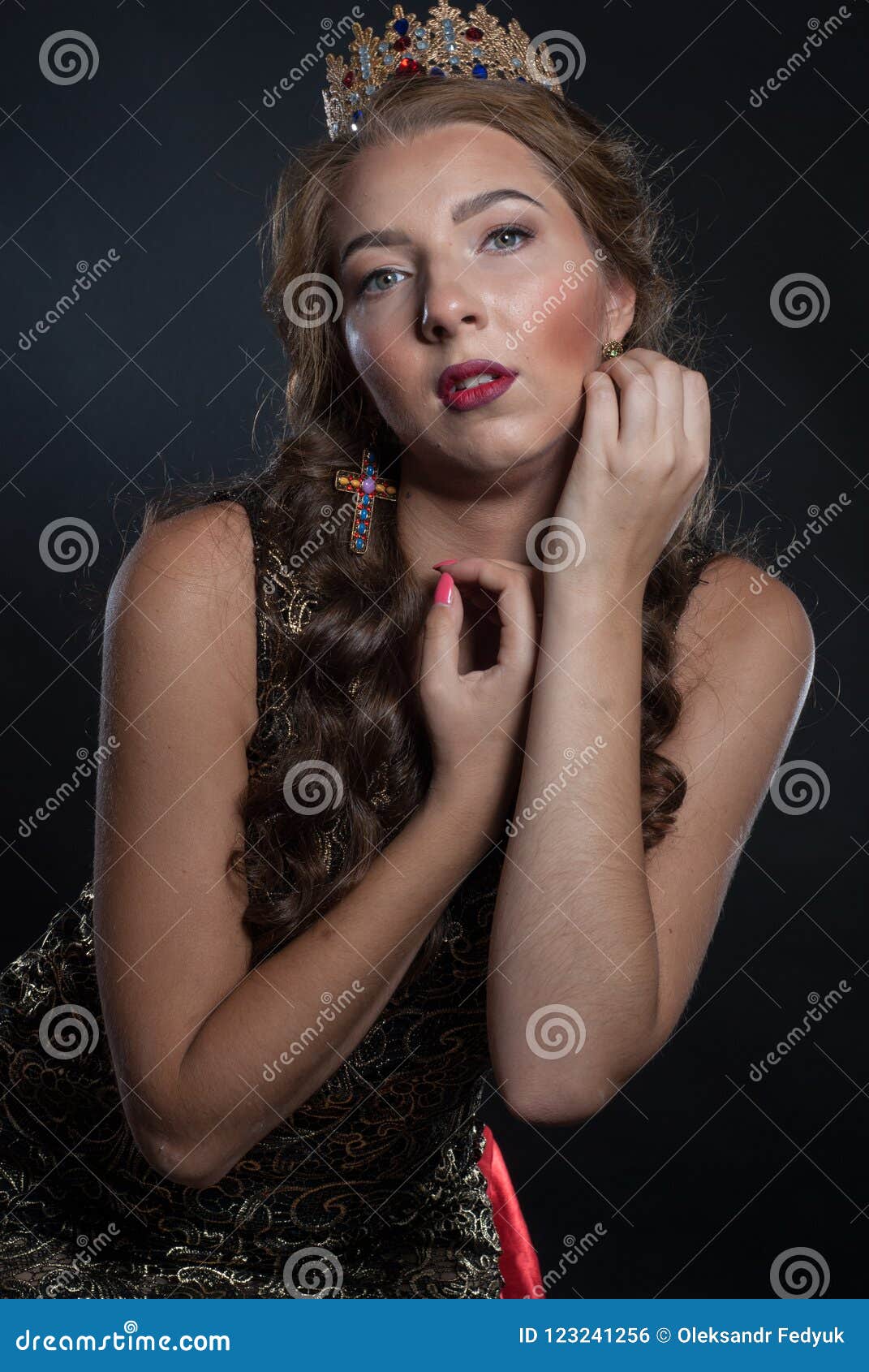 Beautiful Young Woman Posing with a Crown on Her Head Stock Photo ...