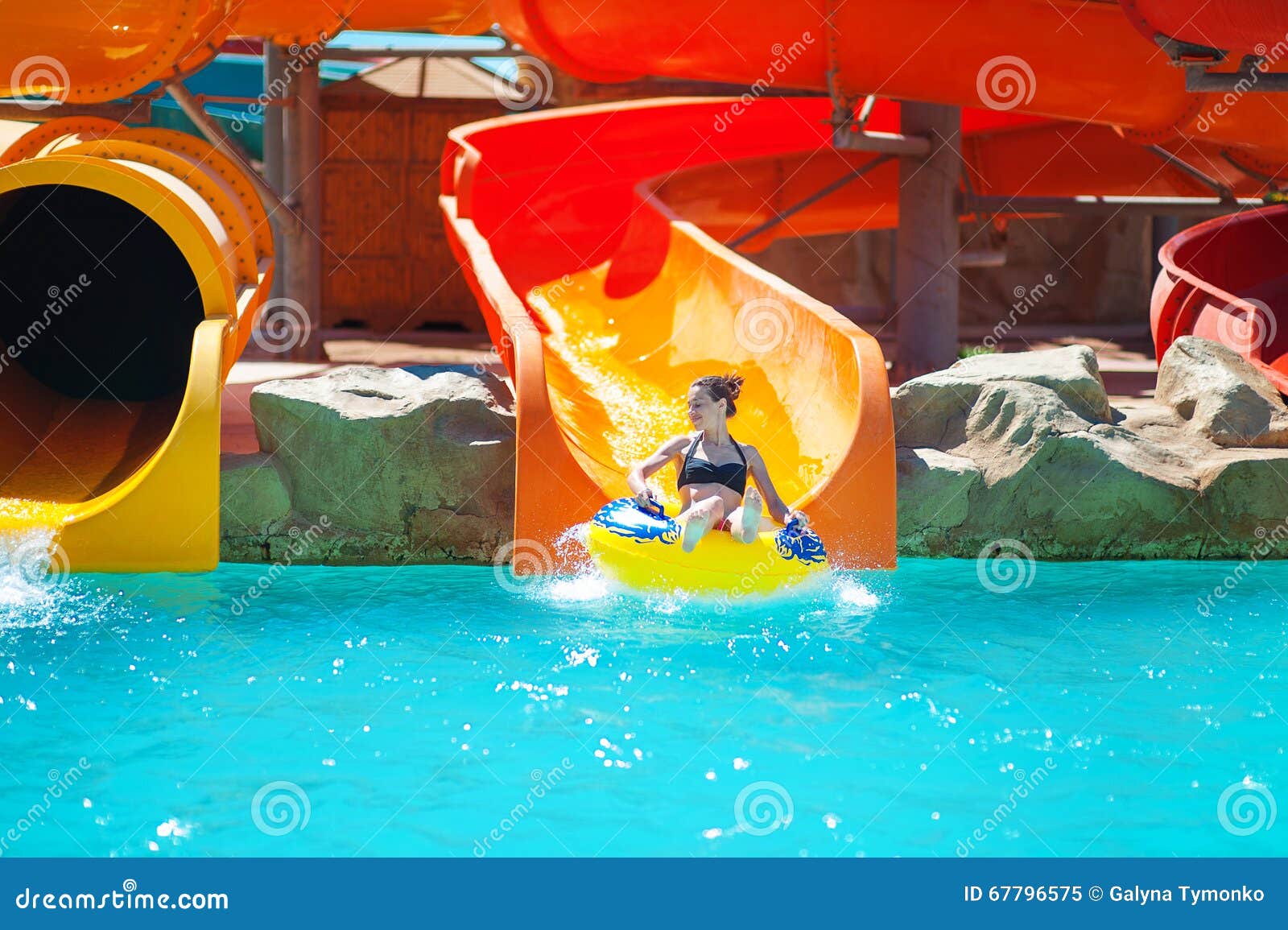 Beautiful Young Woman Pulls Off the Slides in Water Park Stock Image ...