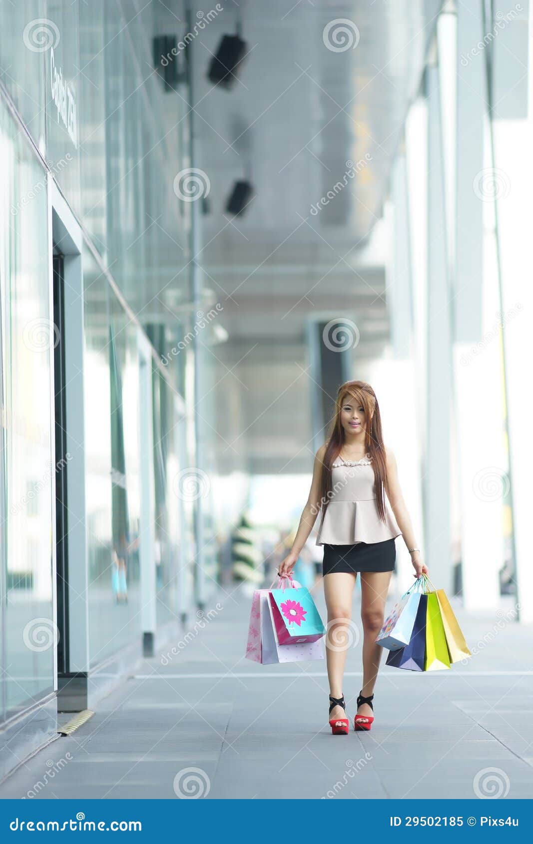 Beautiful Young Woman Shows an Ecstatic Expression while Holding Stock ...