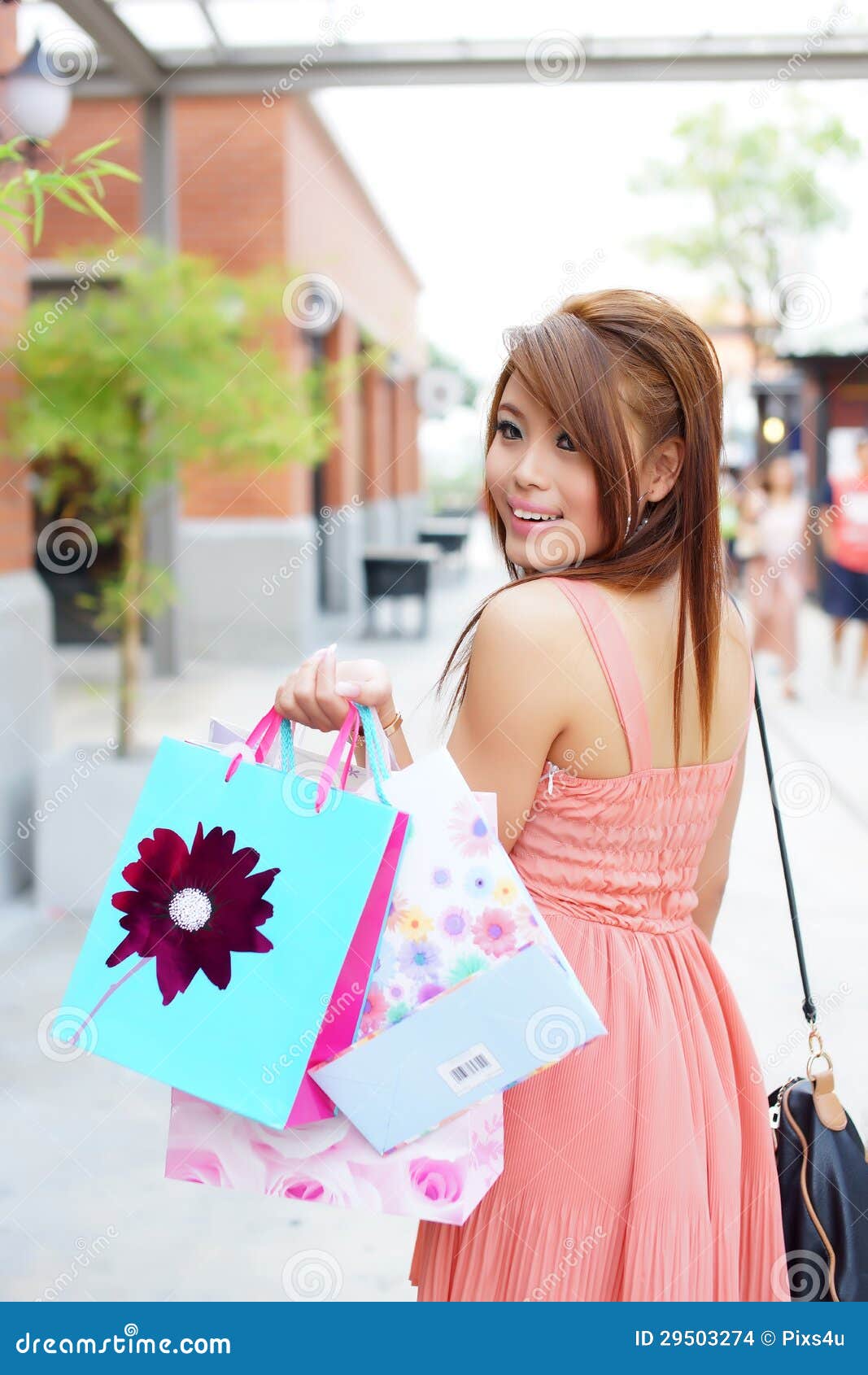 Beautiful Young Woman Shows an Ecstatic Expression while Holding Stock ...