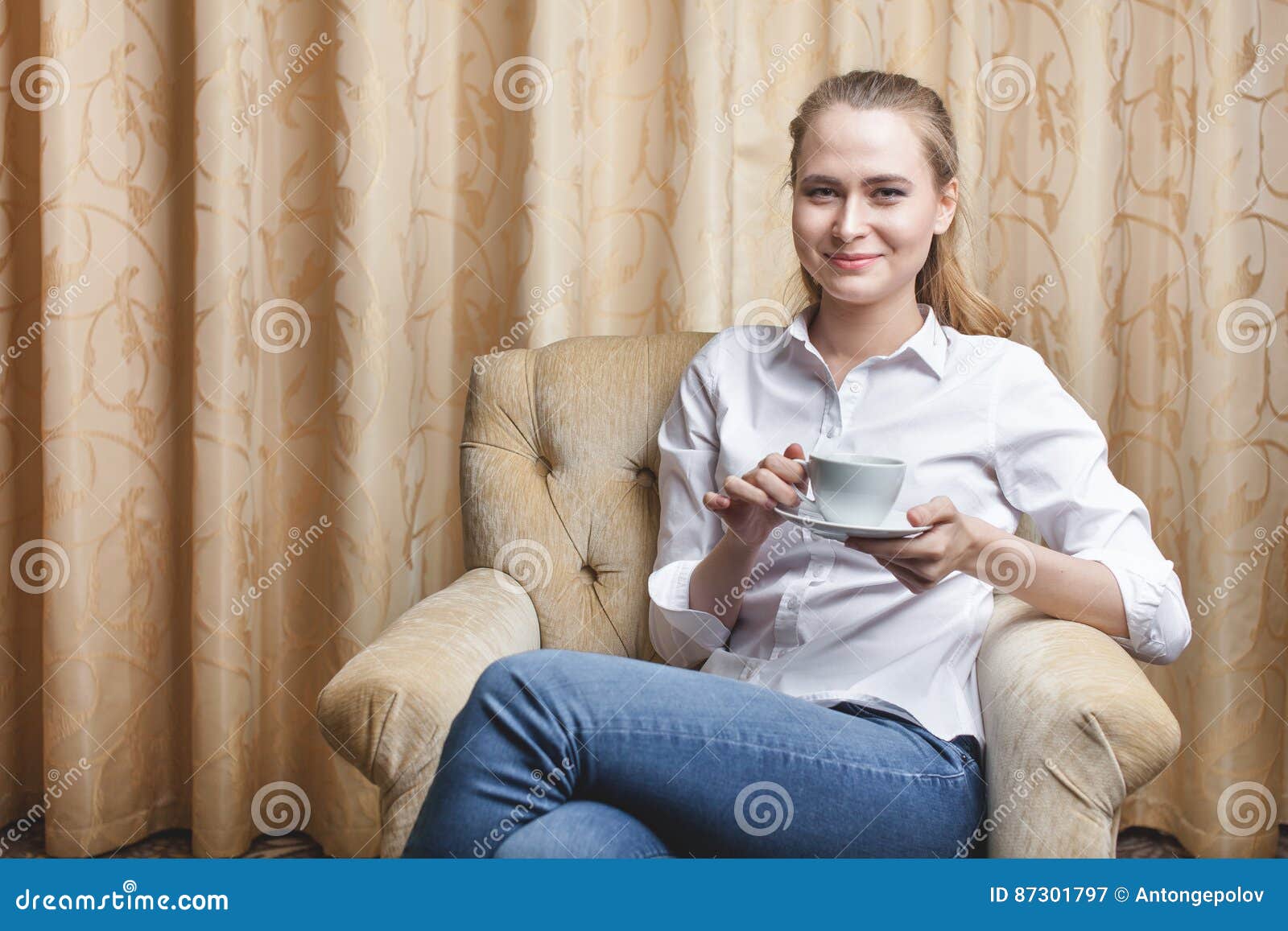 Beautiful Young Woman Sitting with a Cup of Tea Stock Image - Image of ...