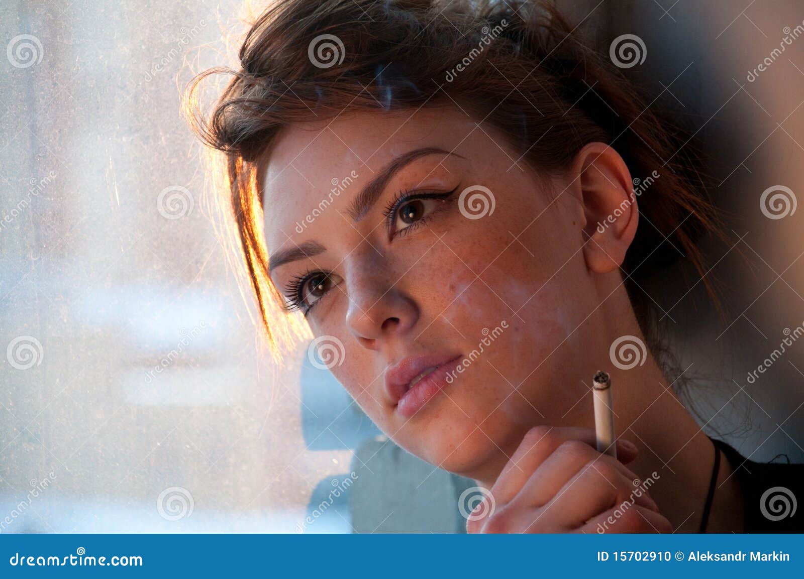 Beautiful Young Woman Smoking on Evening Window. Stock Photo - Image of ...