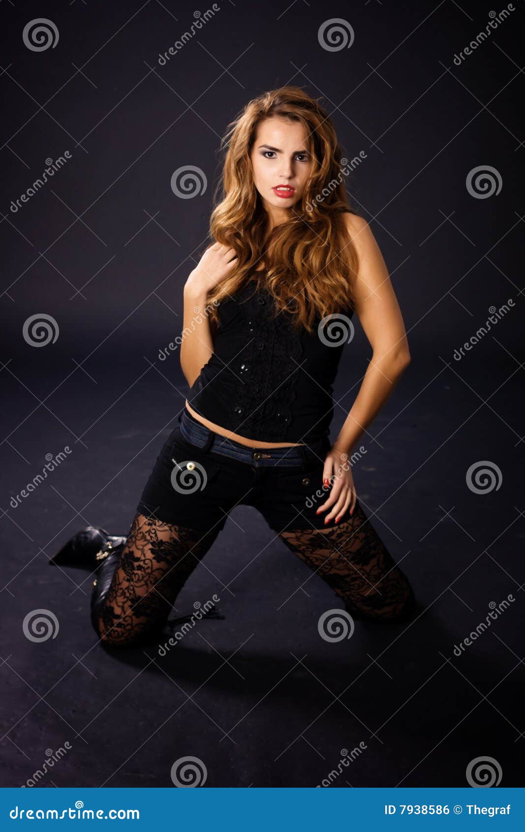 Beautiful Young Woman Standing on the Knees Stock Photo - Image of ...