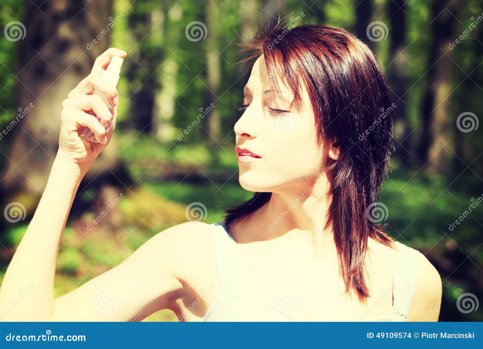 Beautiful Young Woman in Top Using Spray. Stock Photo - Image of makeup ...