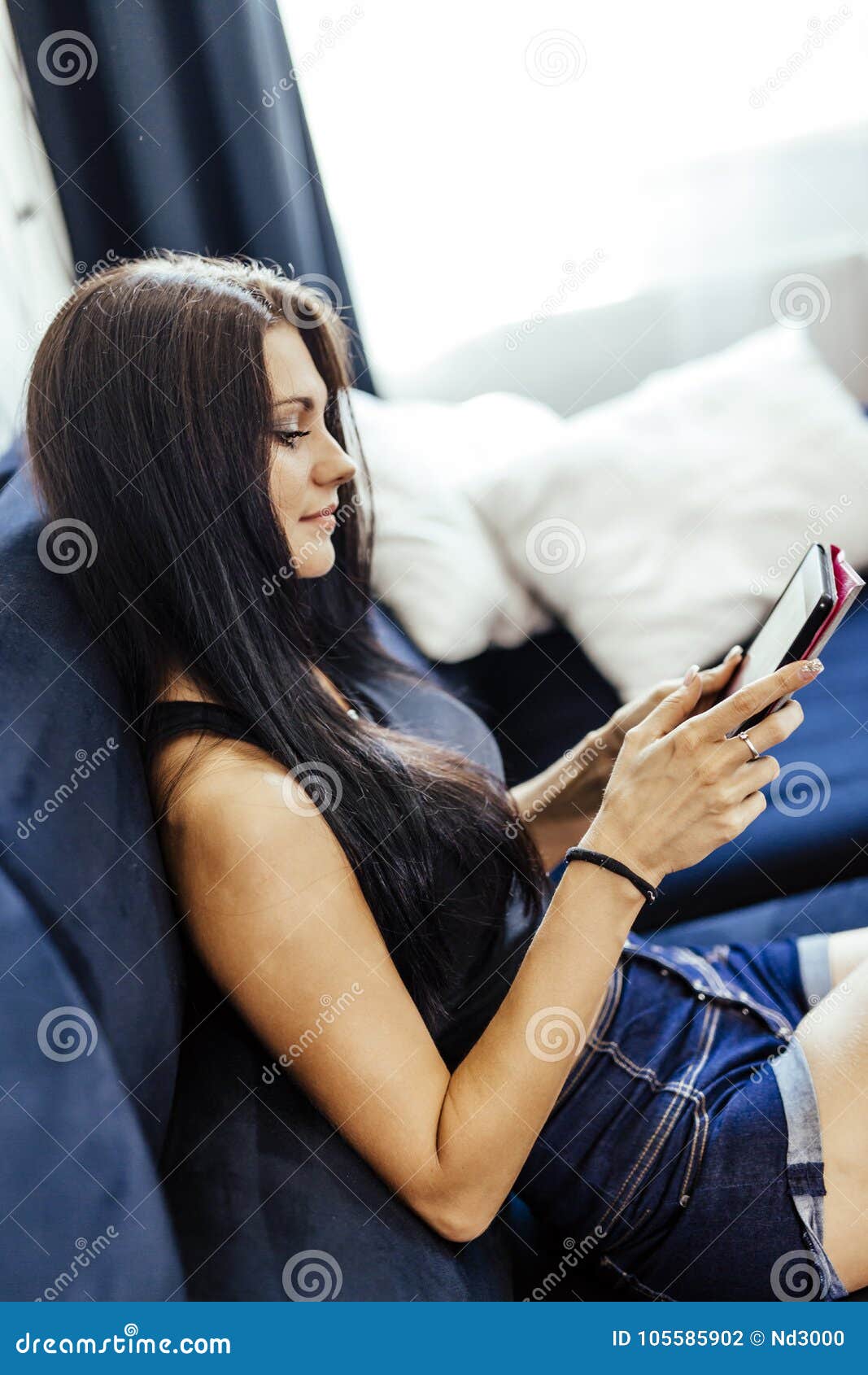Beautiful Young Woman Using a Tablet Stock Photo - Image of touching ... Beautiful Young Woman Using a Tablet Stock Photo - Image of touching ...
