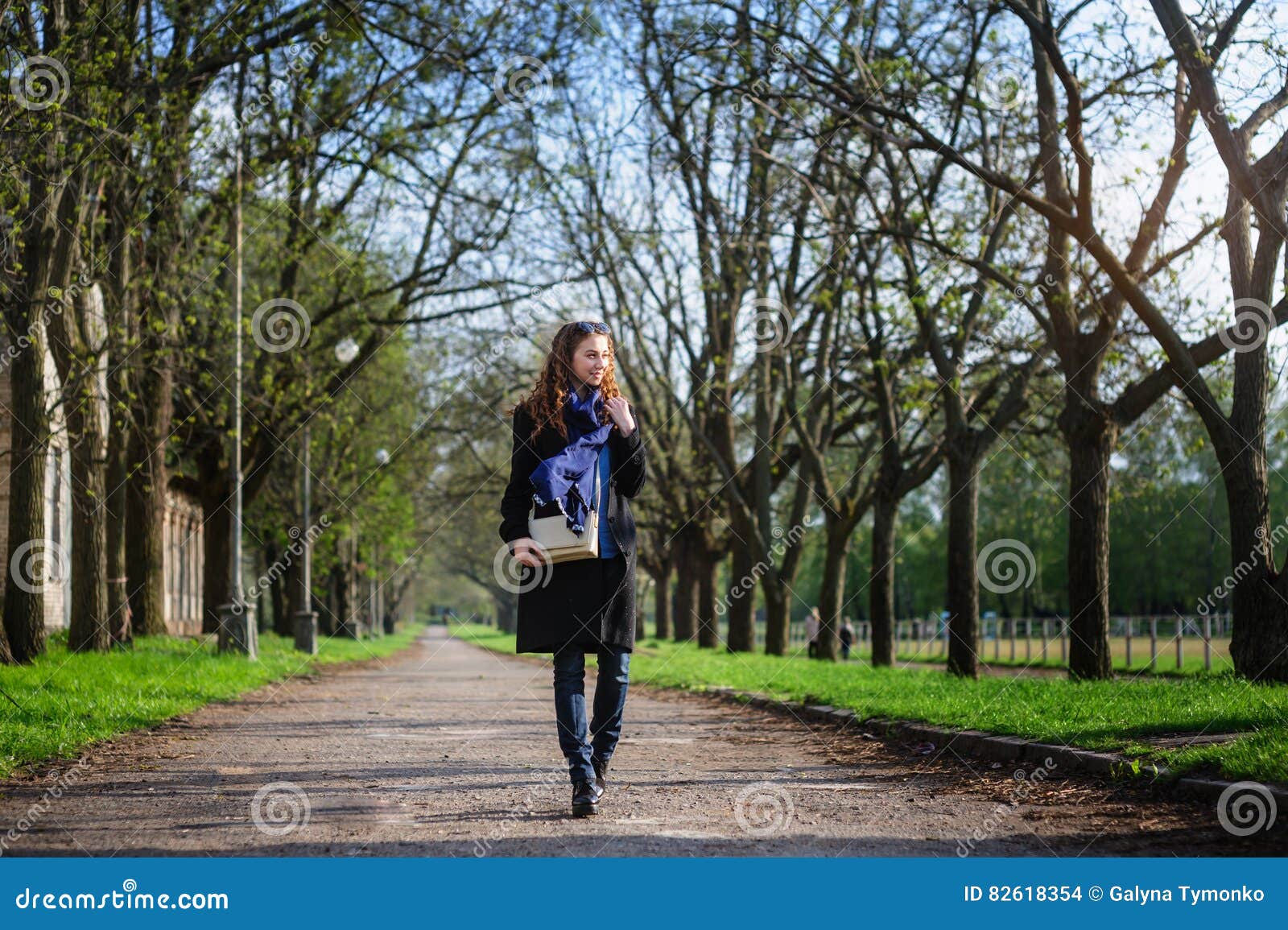 Beautiful Young Woman Walking on Spring Park Stock Photo - Image of ...