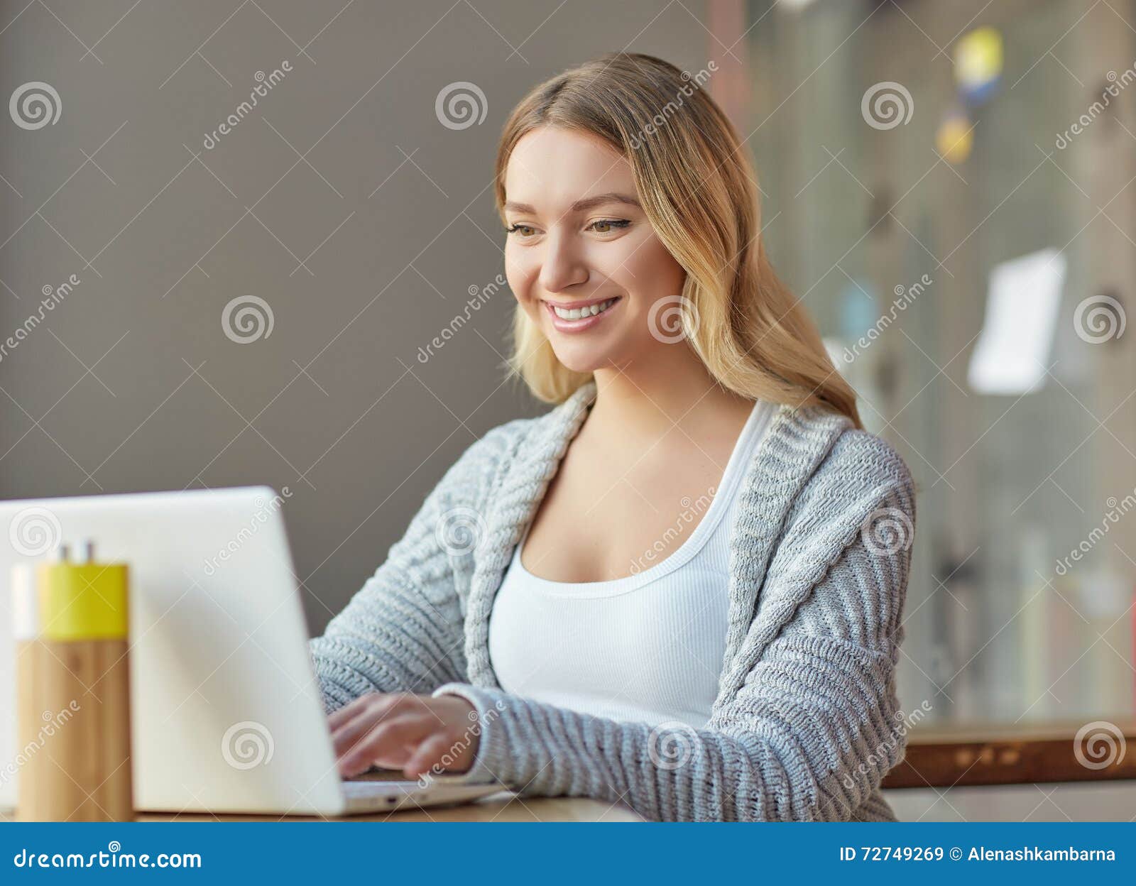 Beautiful Young Woman Working with Computer at Cafe. Working Place ...