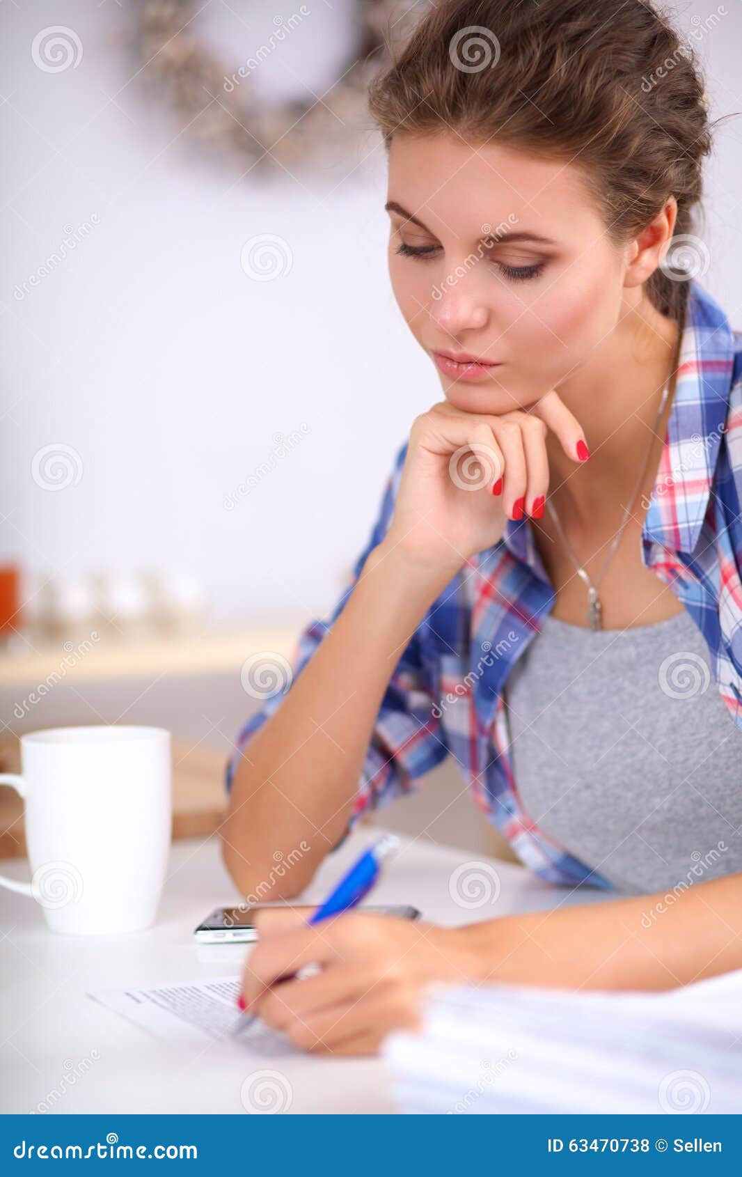 Beautiful Young Woman Writing Something in Her Stock Photo - Image of ...