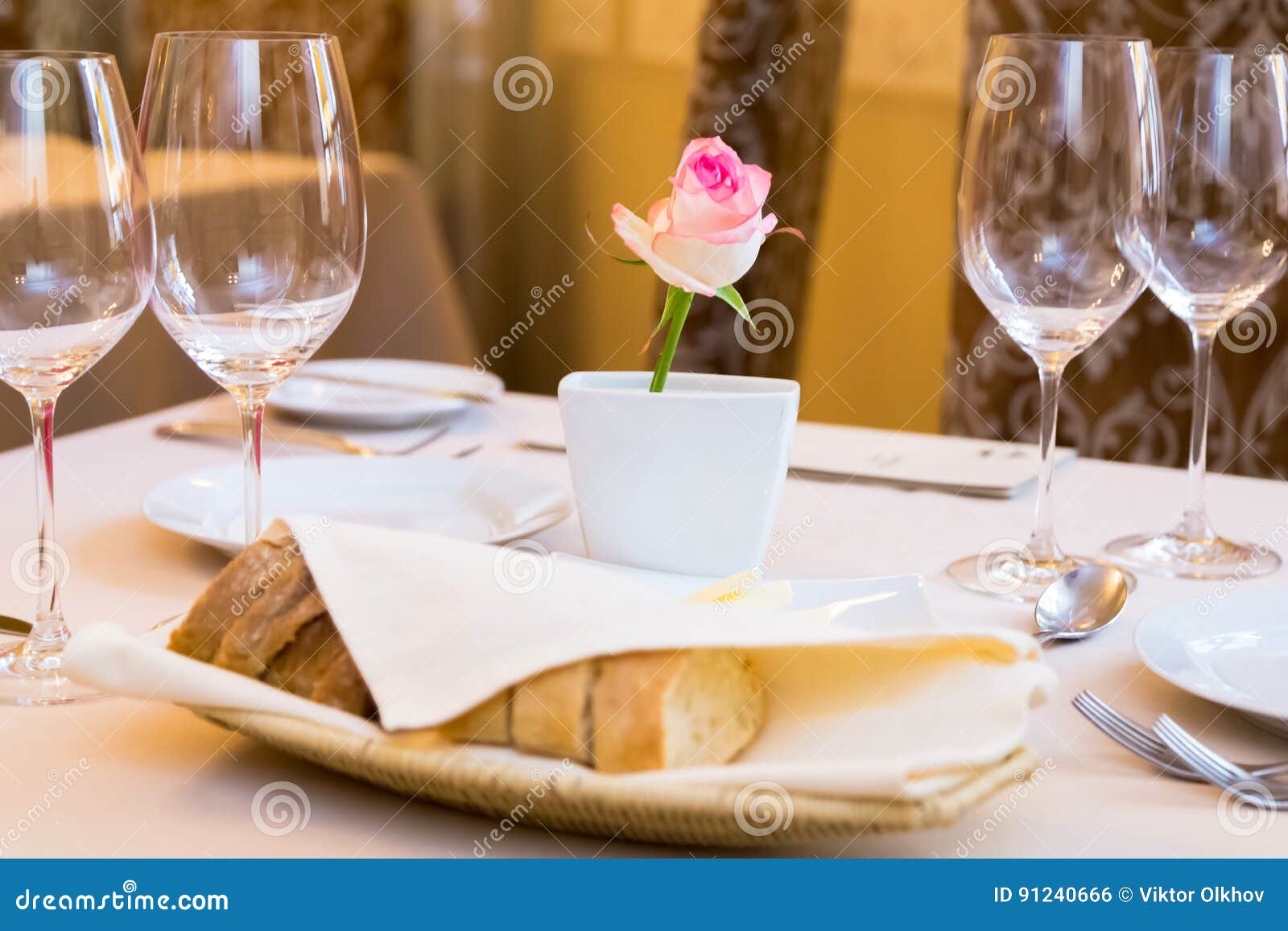 Beautifully Decorated Table in the Restaurant. on the Table is a Vase ...