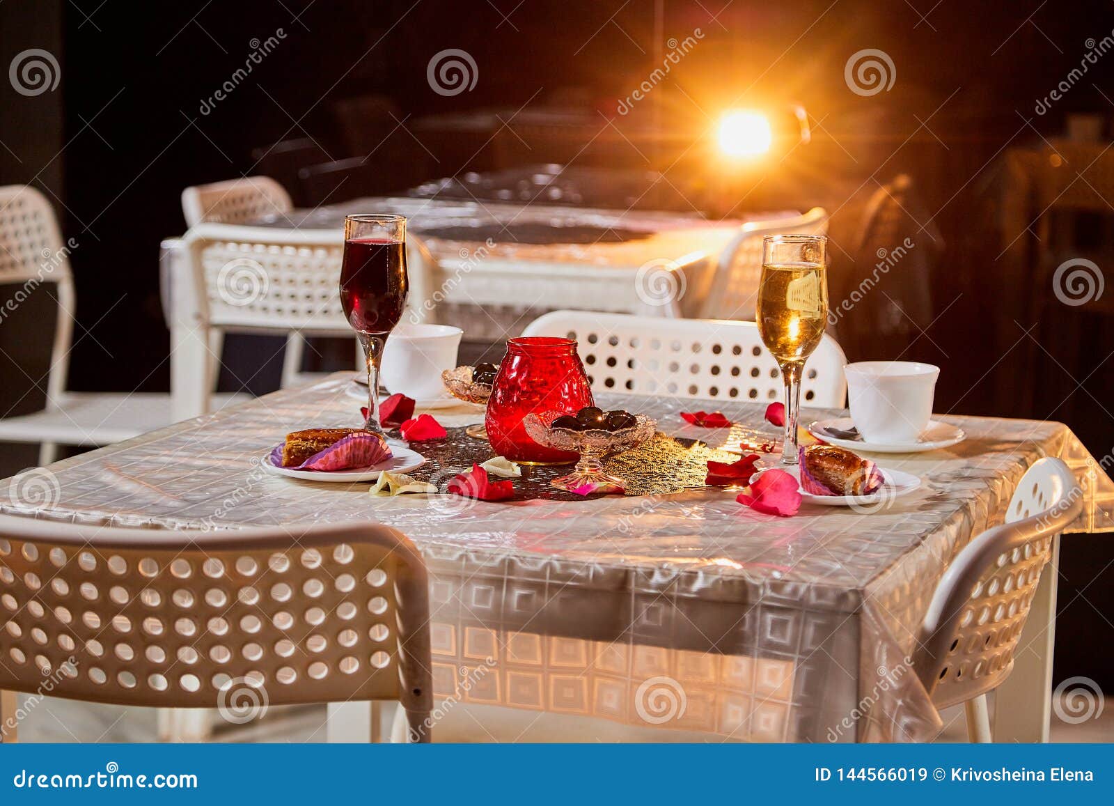 Beautifully Laid Table with White Tablecloth and Wine and Beautiful ...