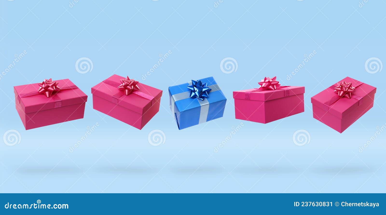 Beautifully Wrapped Gift Boxes on Light Blue Background Stock Image ...